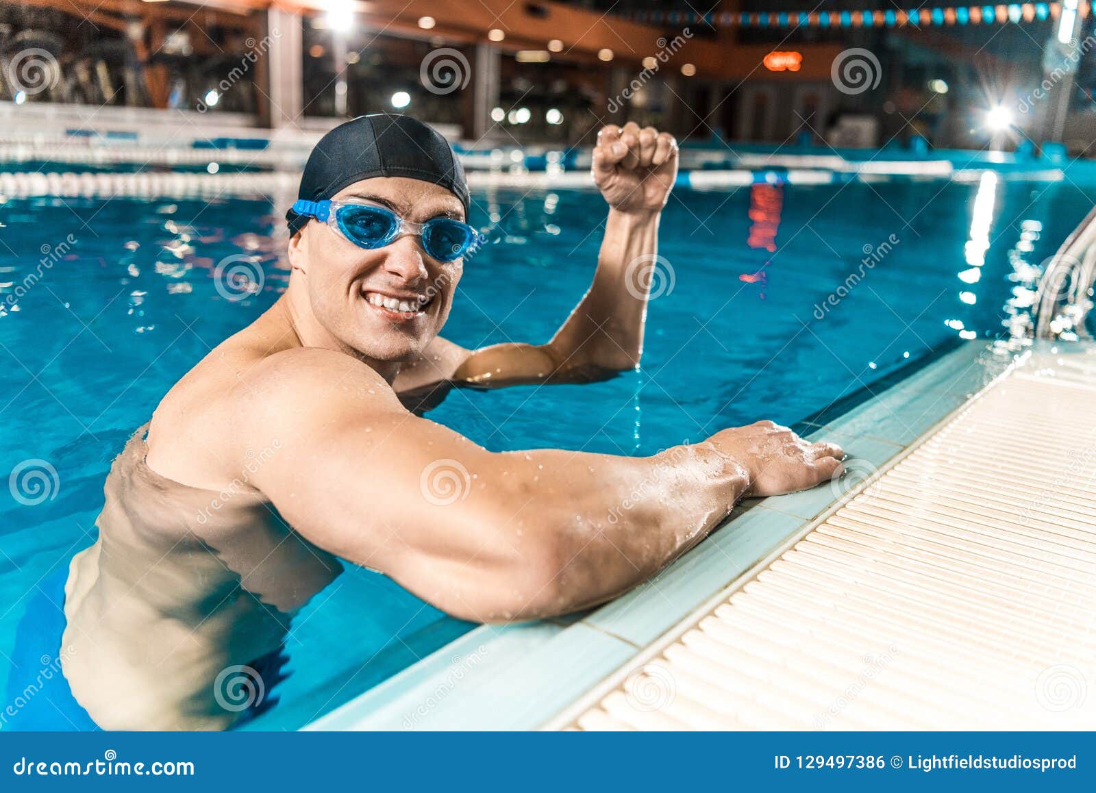 Smiling Swimmer Gesturing and Win Stock Photo - Image of people ...