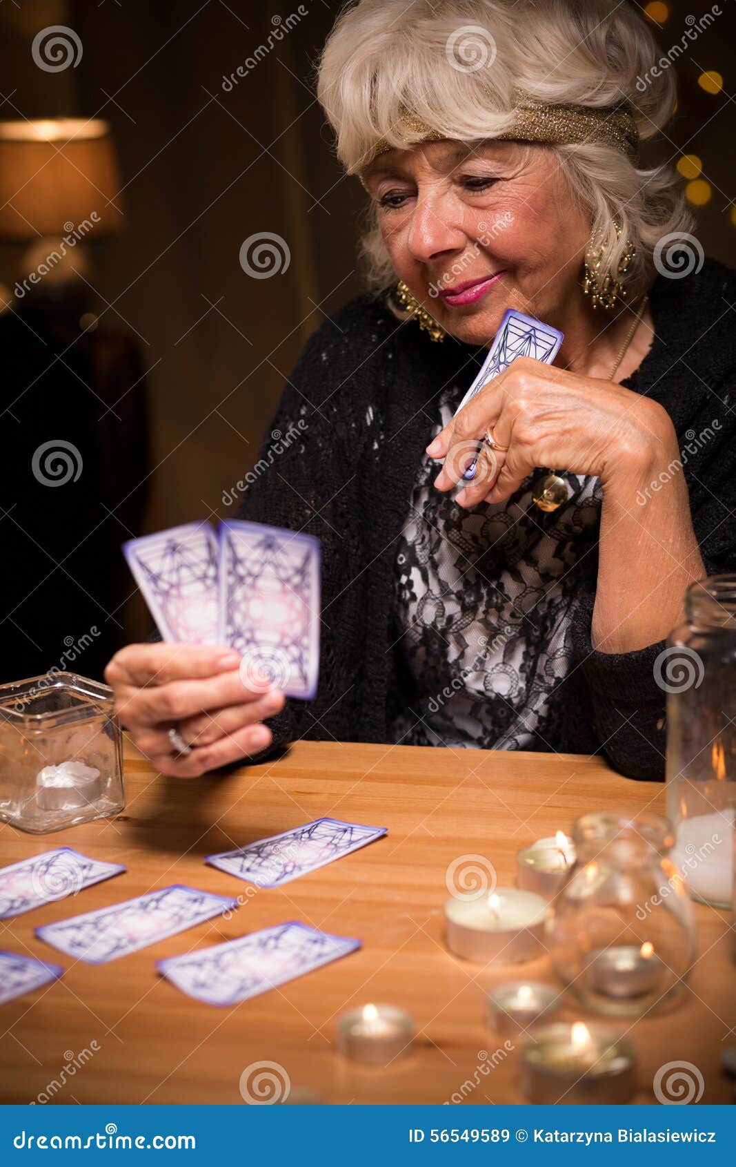 Smiling Tarot Reader Holding Cards Stock Image - Image of belief ...