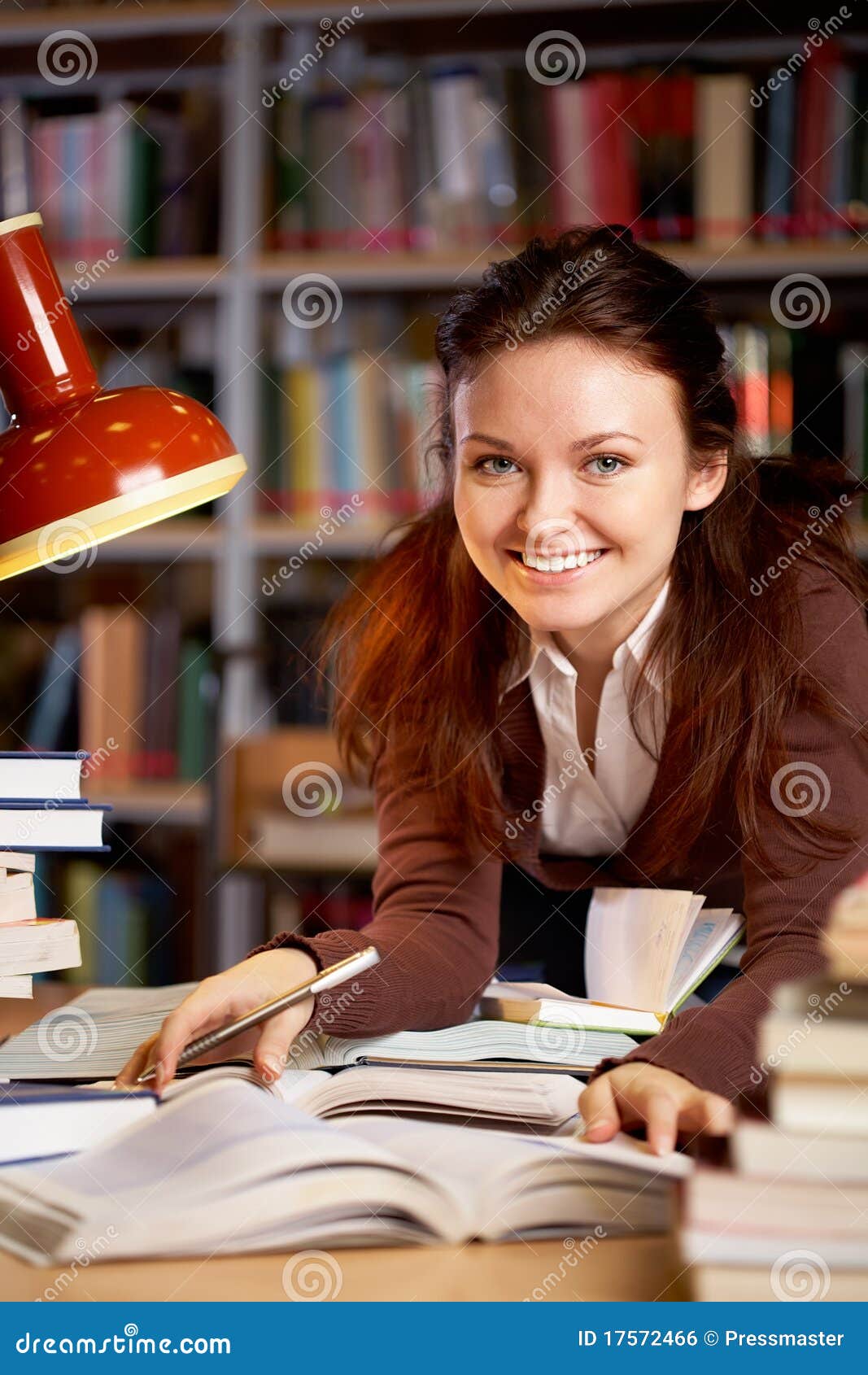 Smiling teacher stock photo. Image of lamp, attractive - 17572466