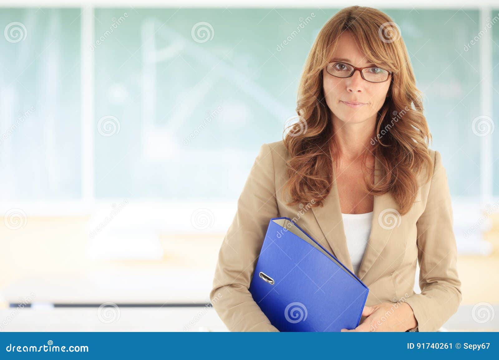 Smiling Teacher in the Classroom Stock Image - Image of education ...