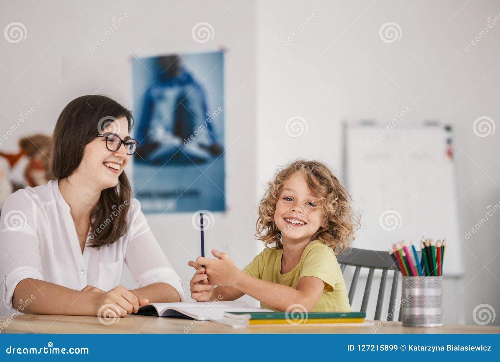 Smiling Teacher and Happy Kid Doing Homework after Classes Stock Image ...