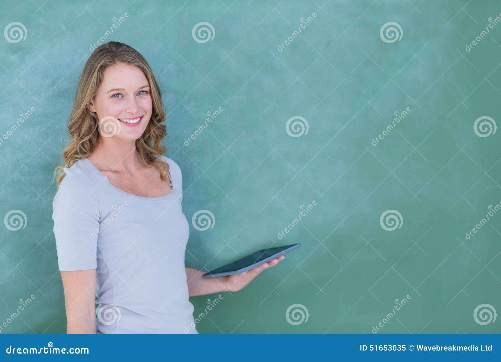 Smiling Teacher Holding Tablet Pc Stock Image - Image of computer ...