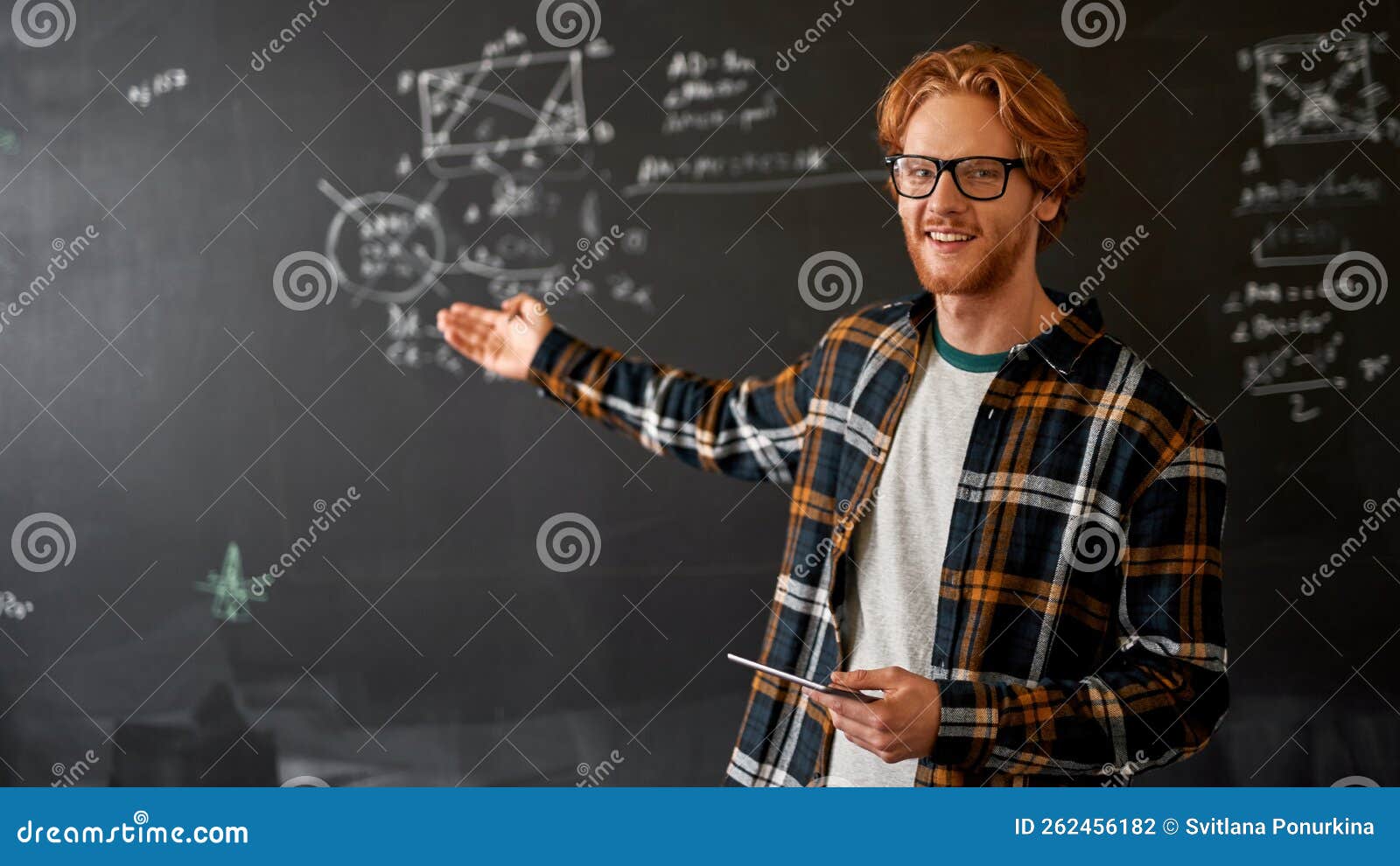 Smiling Teacher Point at Blackboard with Formulas Stock Photo - Image ...