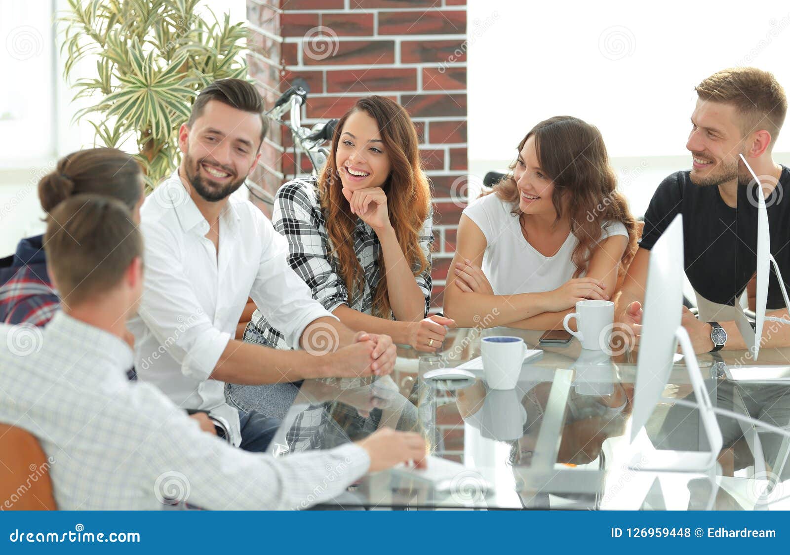 Smiling Team Discussing the Current Problems Stock Photo - Image of ...
