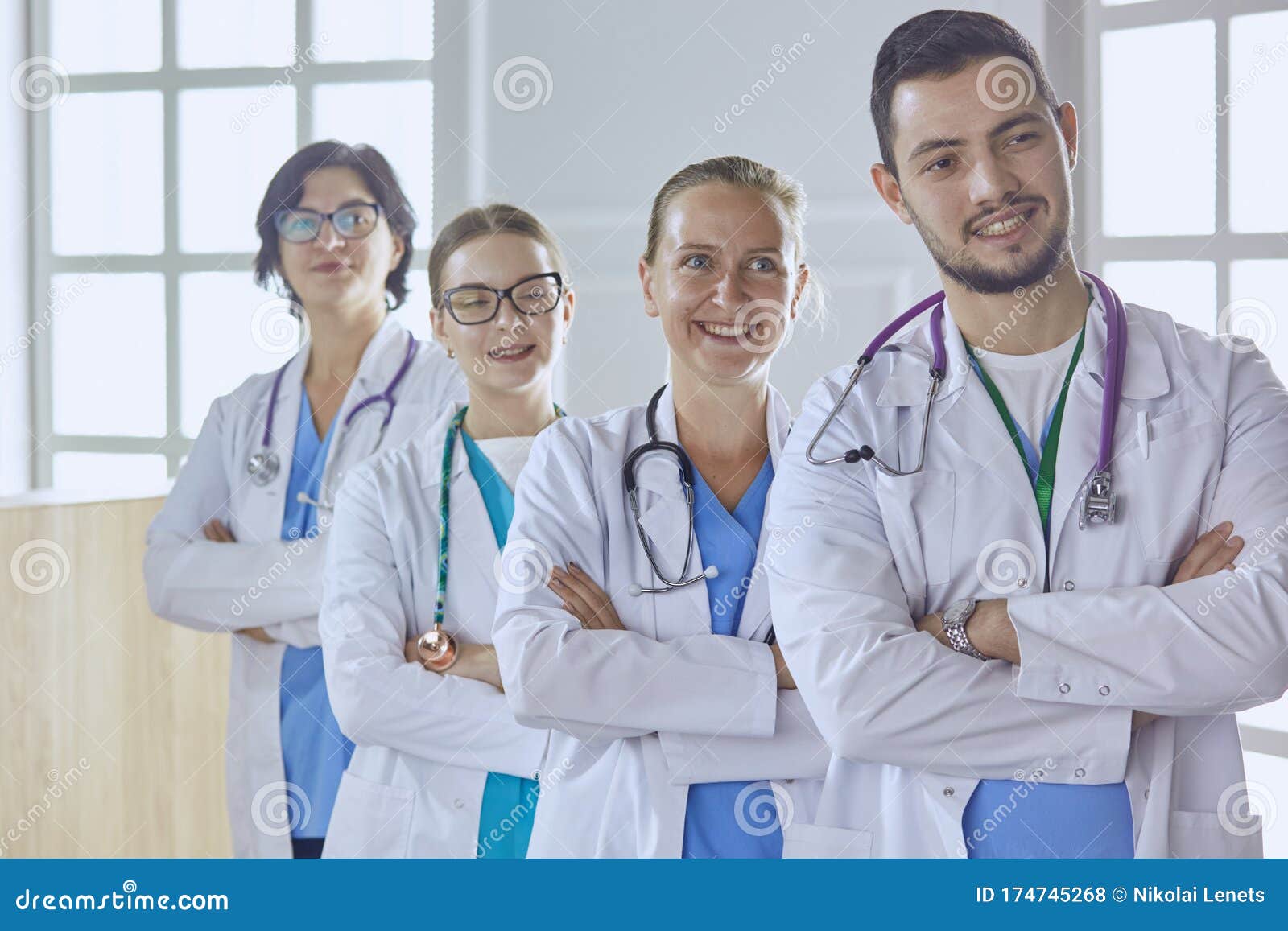 Smiling Team of Doctors and Nurses at Hospital Stock Photo - Image of ...