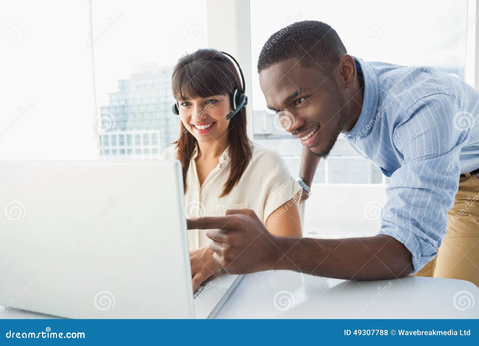 Smiling Team Using Laptop and Headset Stock Photo - Image of brainstorm ...
