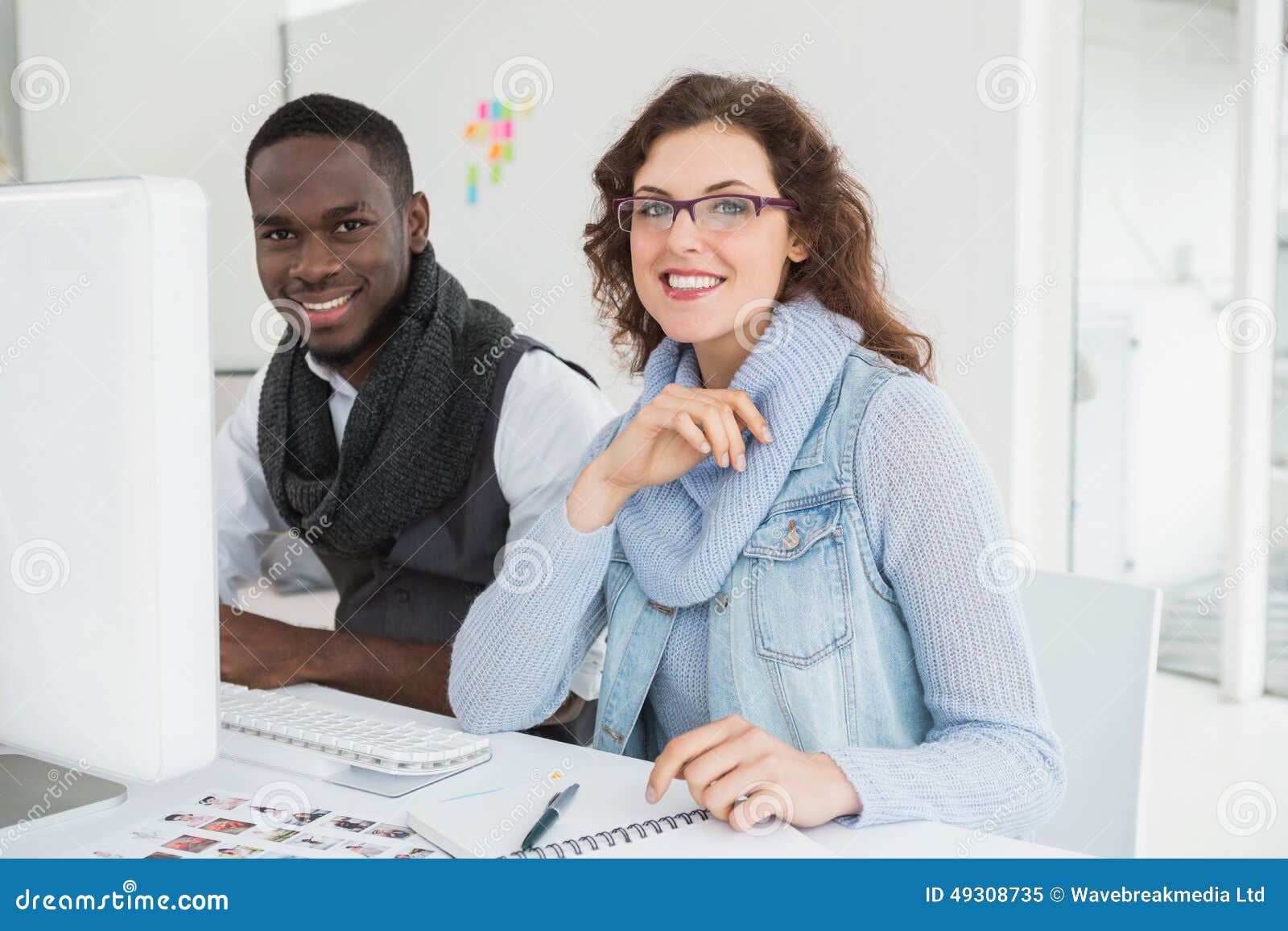 Smiling Teamwork Using Computer Monitor Stock Image - Image of female ...