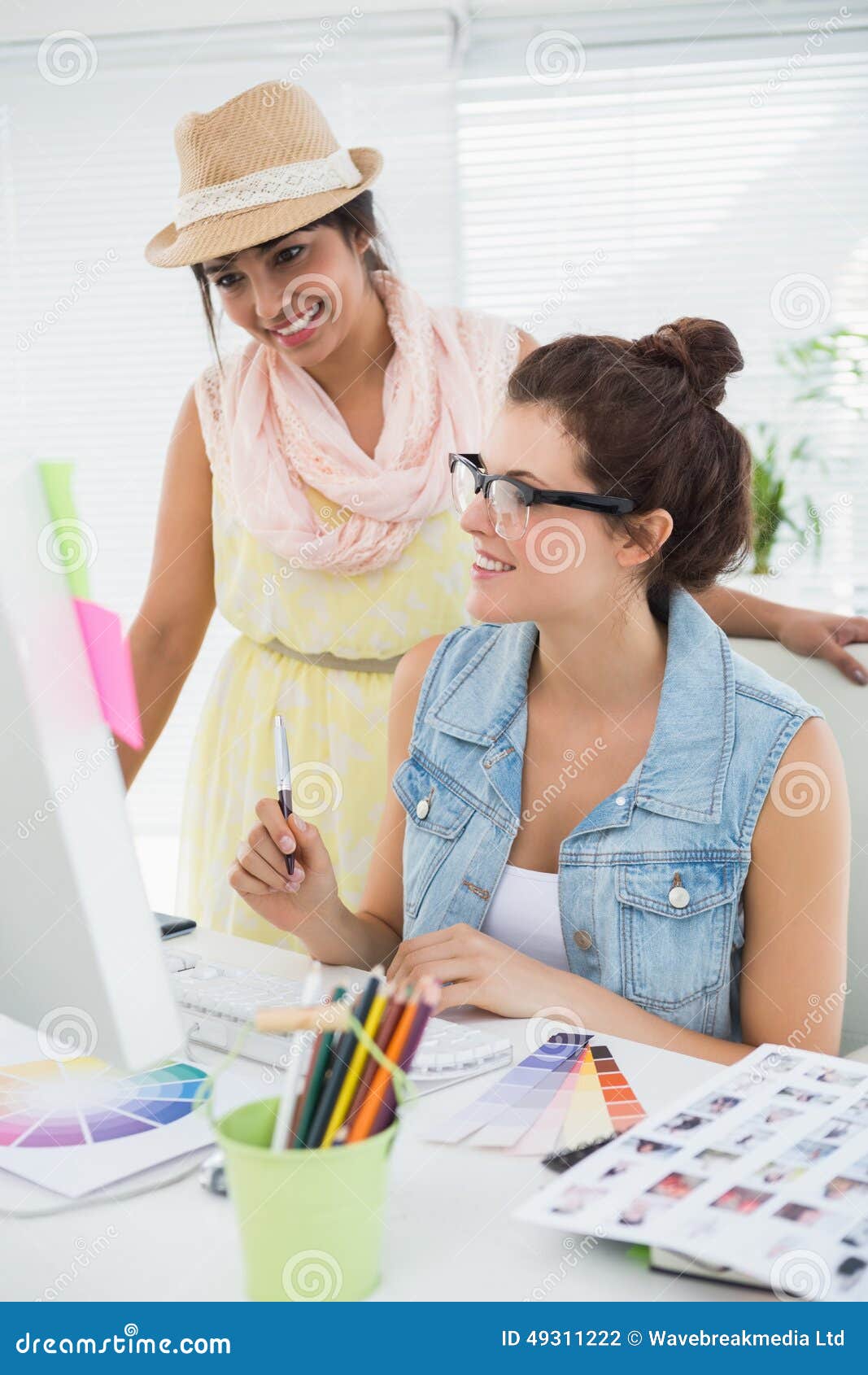 Smiling Teamwork Using Computer Together Stock Photo - Image of ...
