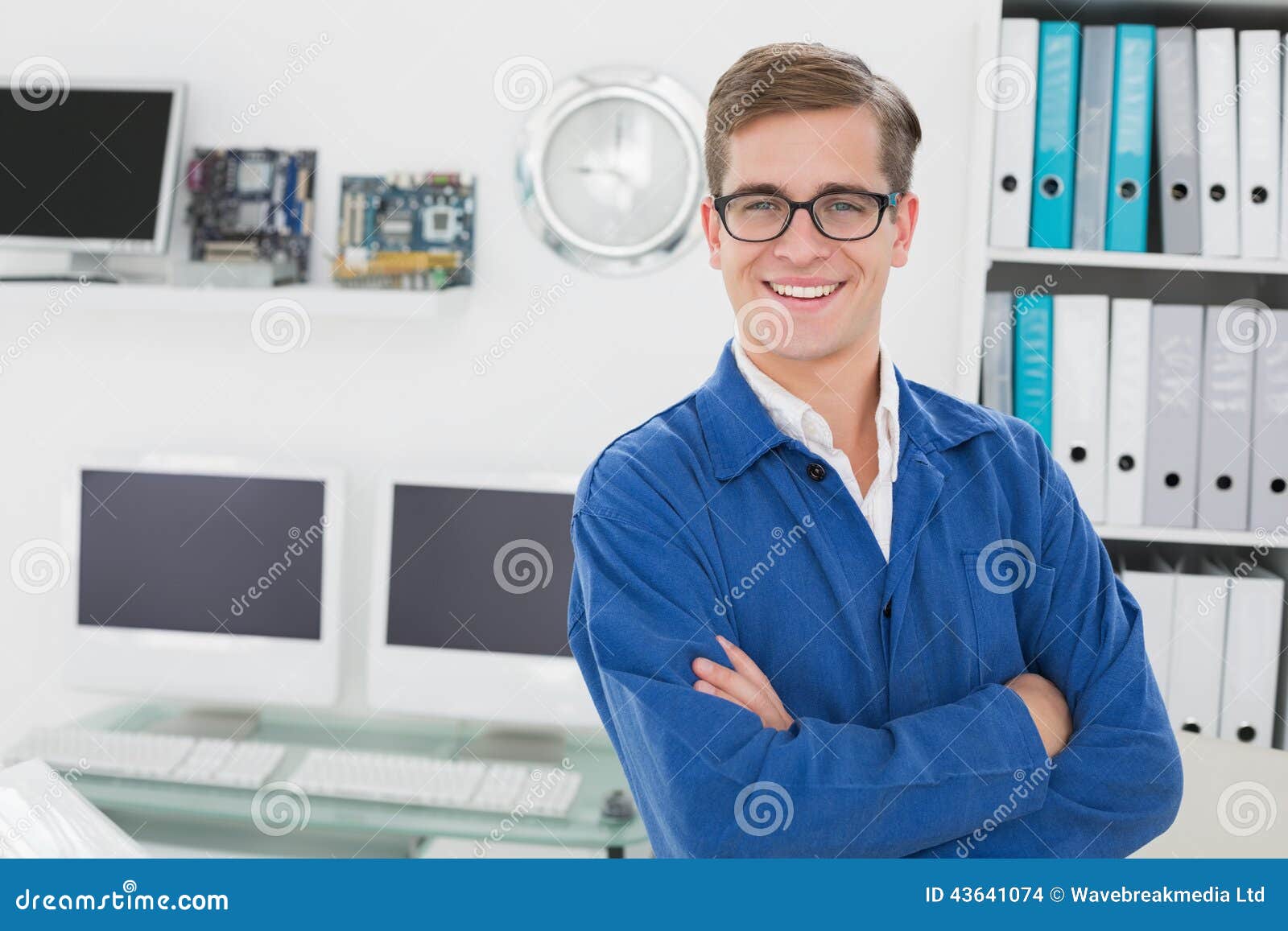 Smiling Technician Looking at Camera Stock Photo - Image of system ...