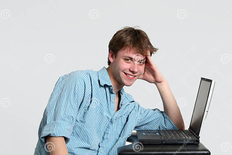 Smiling Teen Boy at Computer Stock Image - Image of shot, people: 8856145