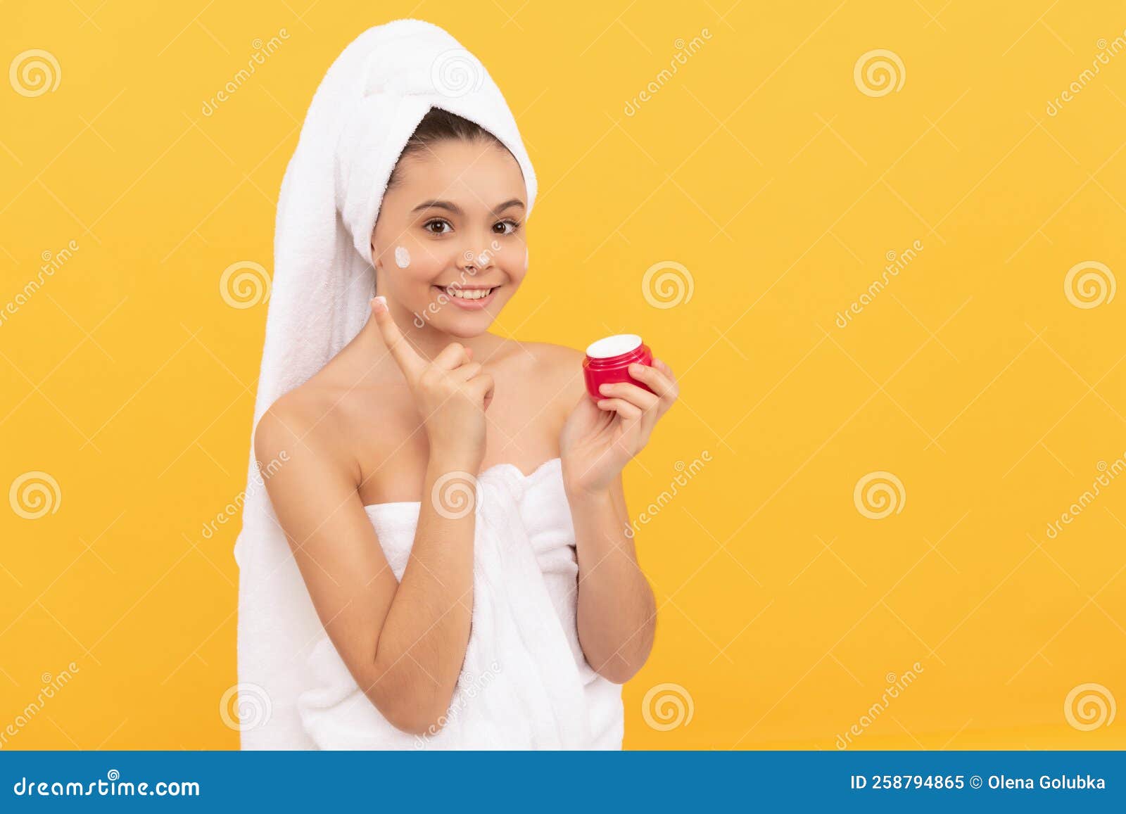Smiling Teen Girl In Shower Towel Apply Facial Cream Stock Image