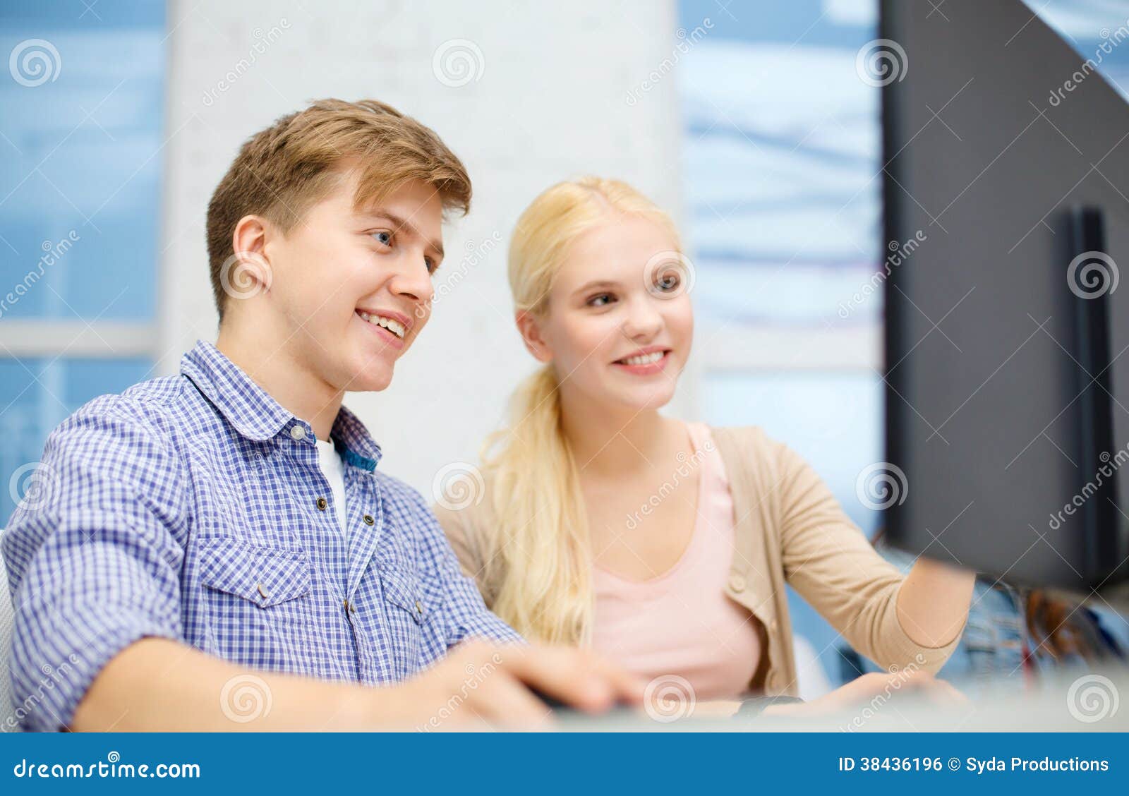 Smiling Teenage Boy and Girl in Computer Class Stock Photo - Image of ...