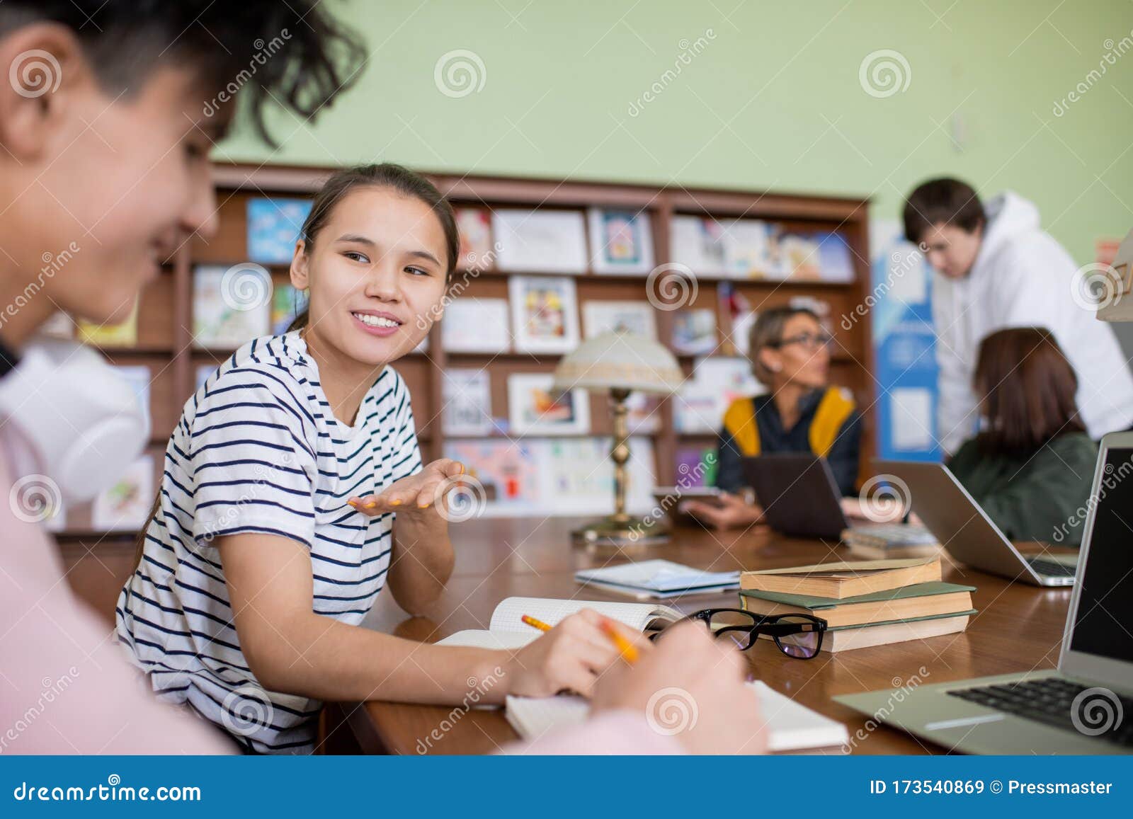 Smiling Teenage Student Sharing Her Opinion about Points of Project ...