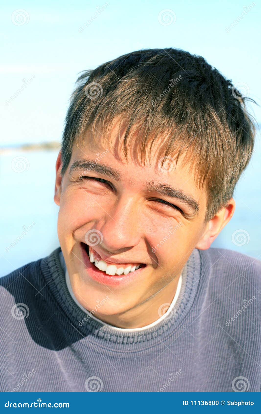 Smiling teenager stock photo. Image of cute, head, sand - 11136800