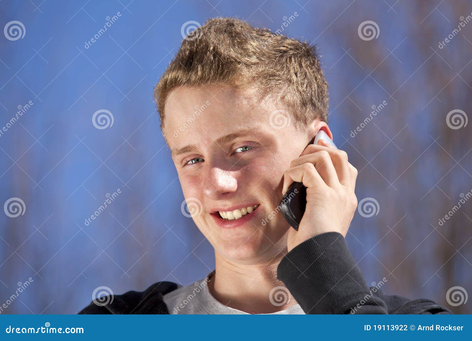 Smiling Teenager with Cell Phone Stock Photo - Image of communications ...