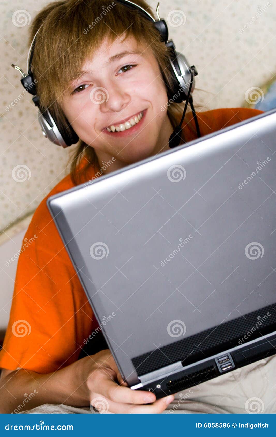 Smiling Teenager with a Laptop Stock Photo - Image of happiness ...