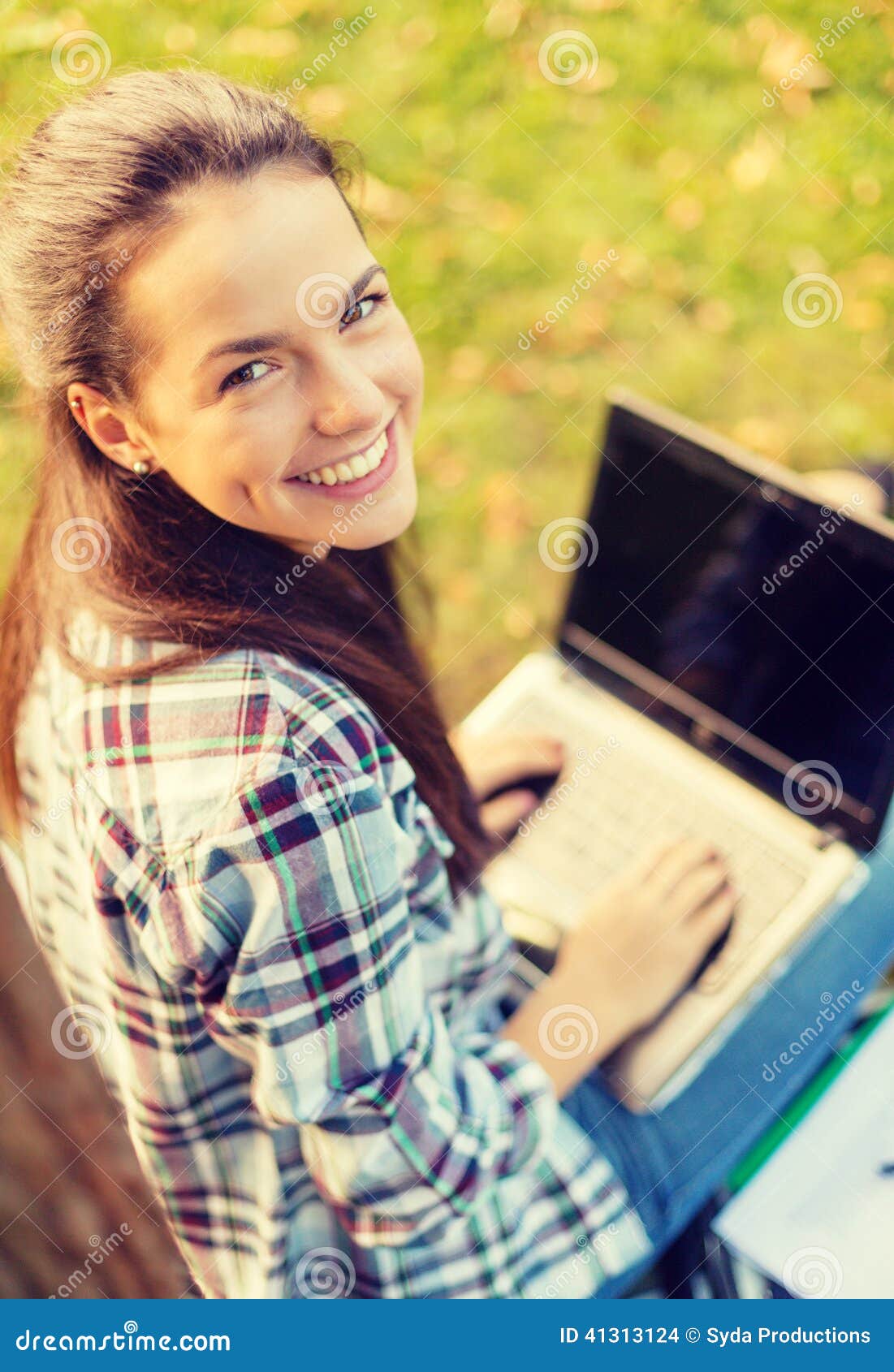 Smiling Teenager with Laptop Stock Photo - Image of chatting, college ...