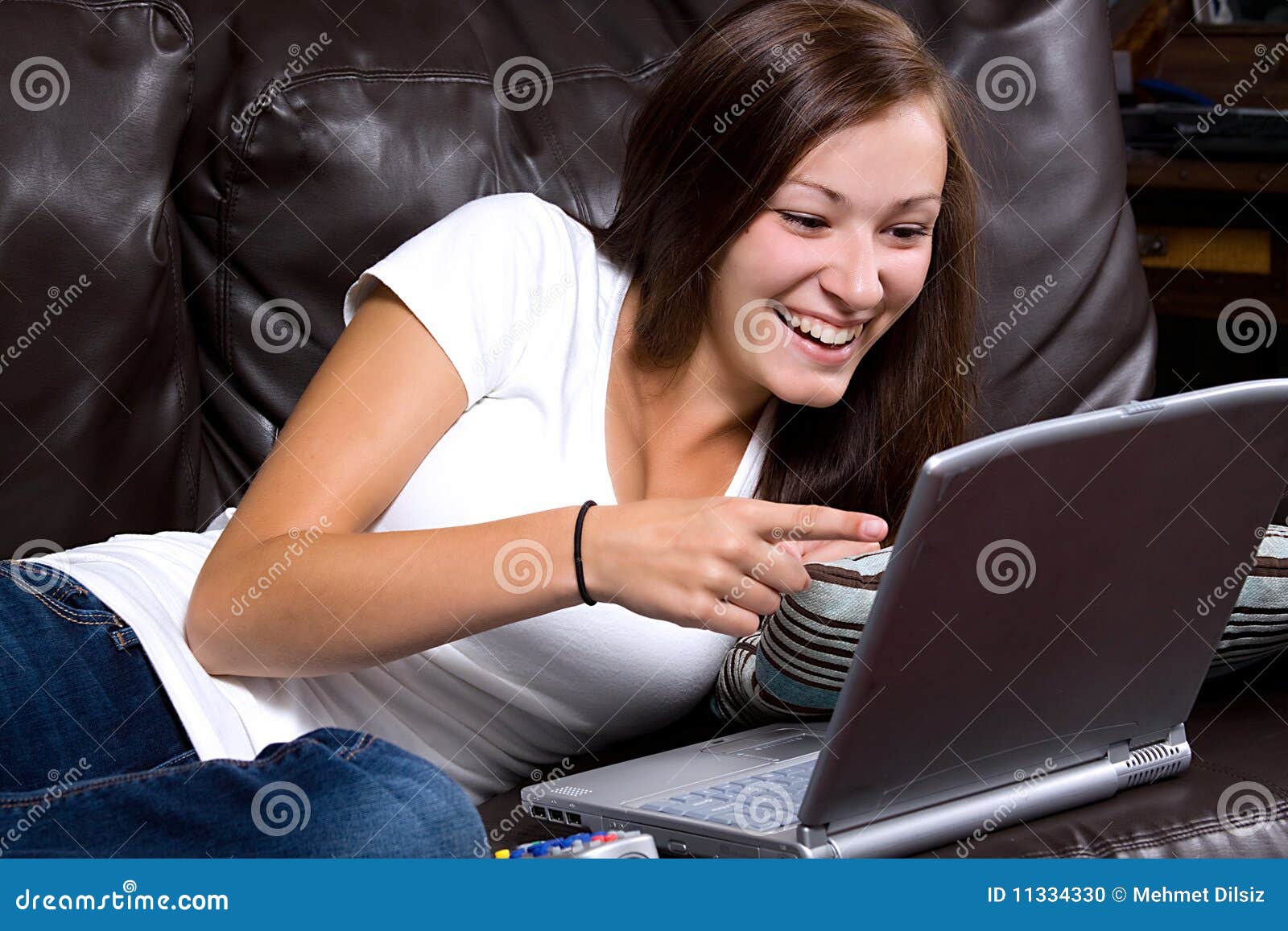 Smiling Teenager Looking at the Computer Stock Photo - Image of ...