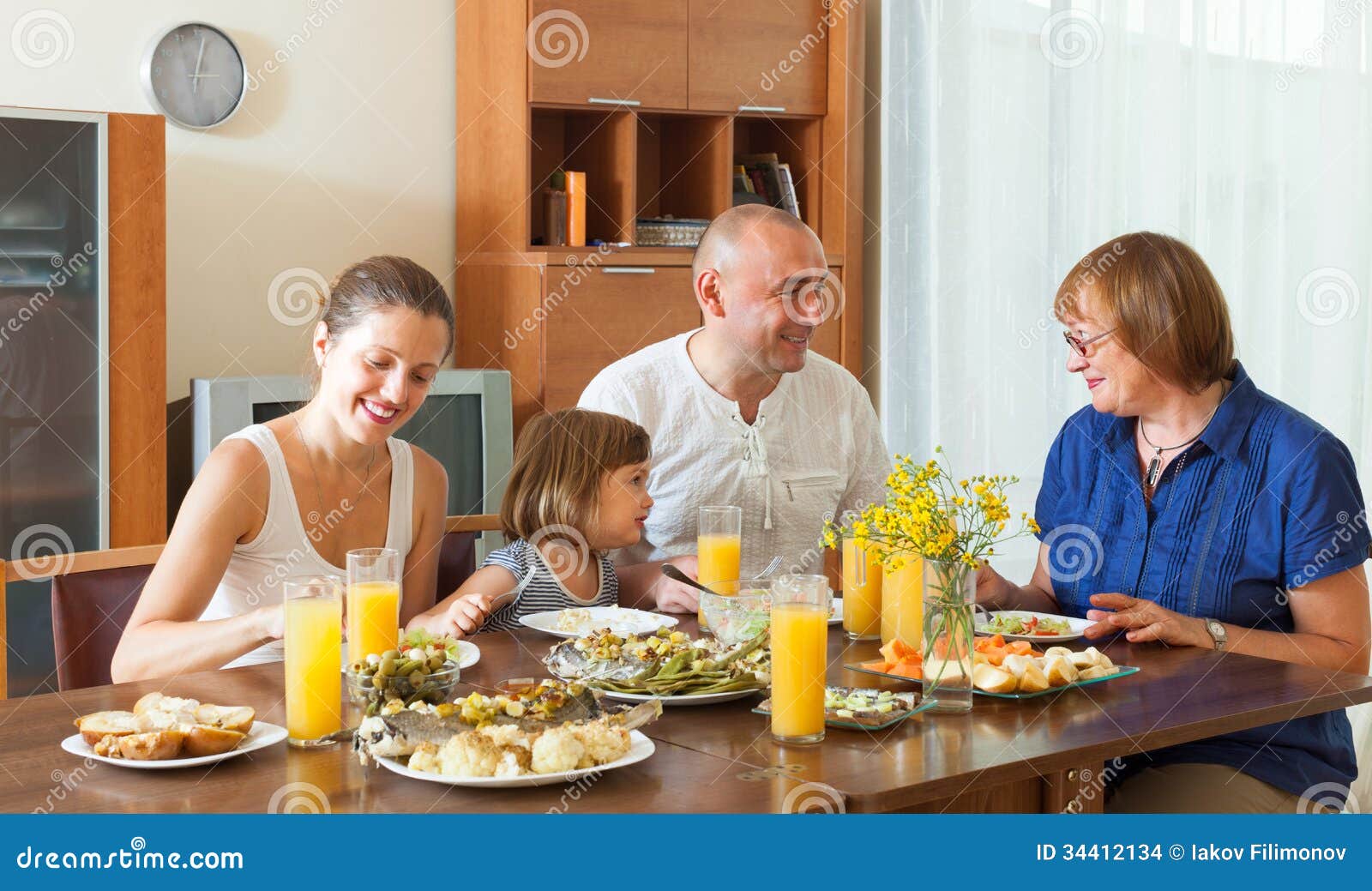 Smiling Three Generations Family Stock Photo - Image of glass, group ...