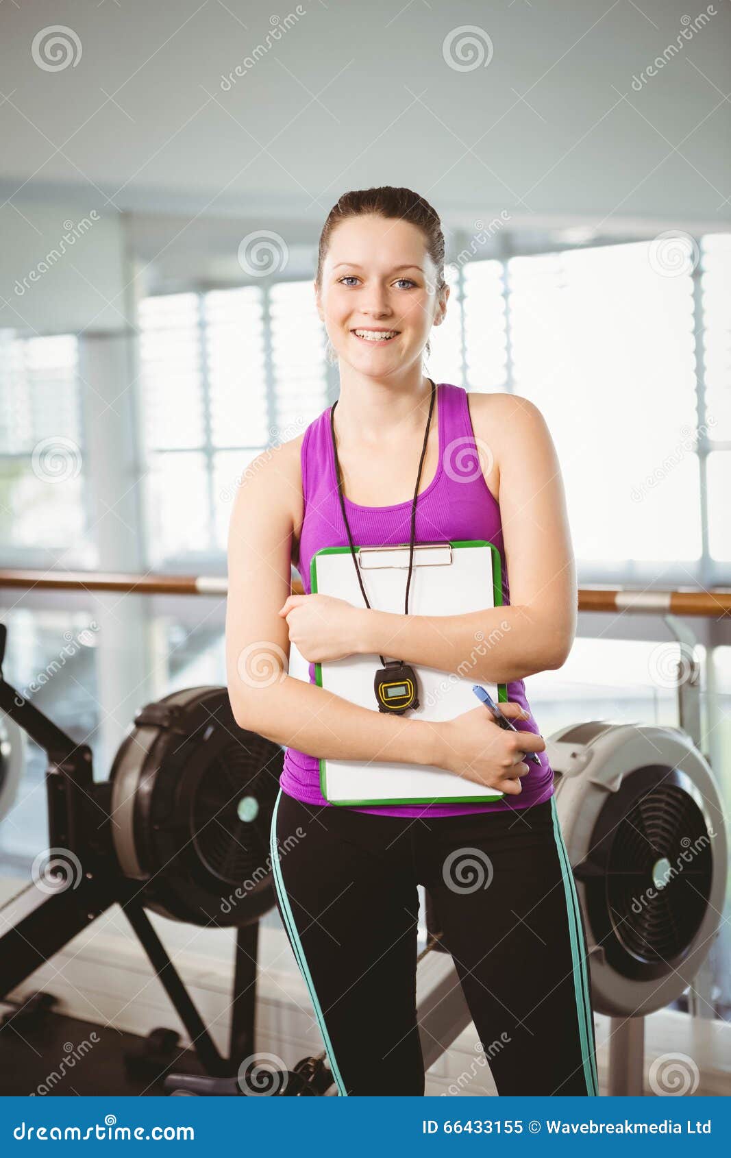 Smiling Trainer Holding Clipboard Stock Image - Image of pretty, happy ...