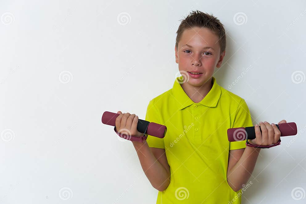 Smiling Tween Child Doing Biceps Exercise Stock Image - Image of ...