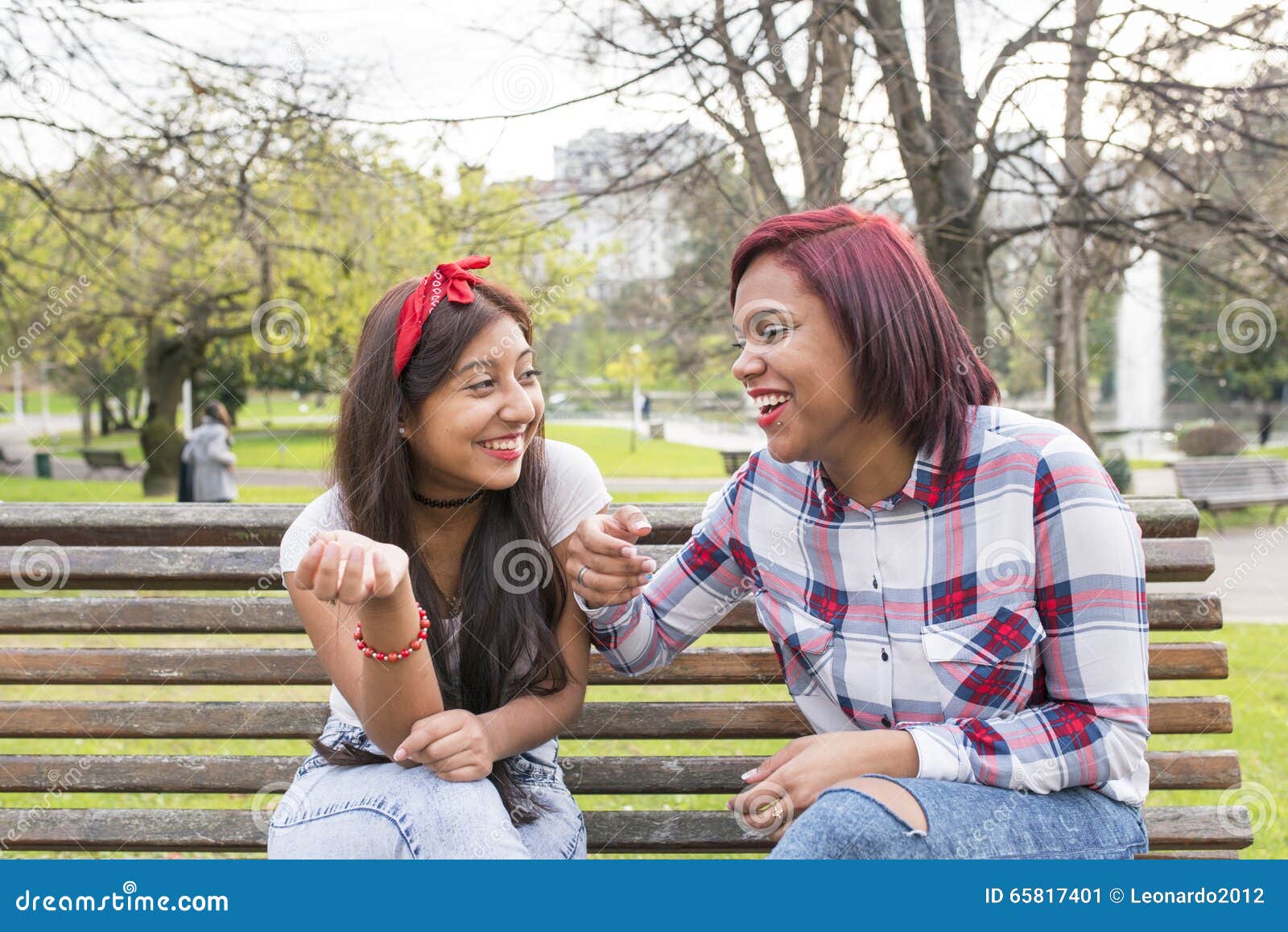 Smiling Two Friends Talking in the Park. Stock Image - Image of talk ...