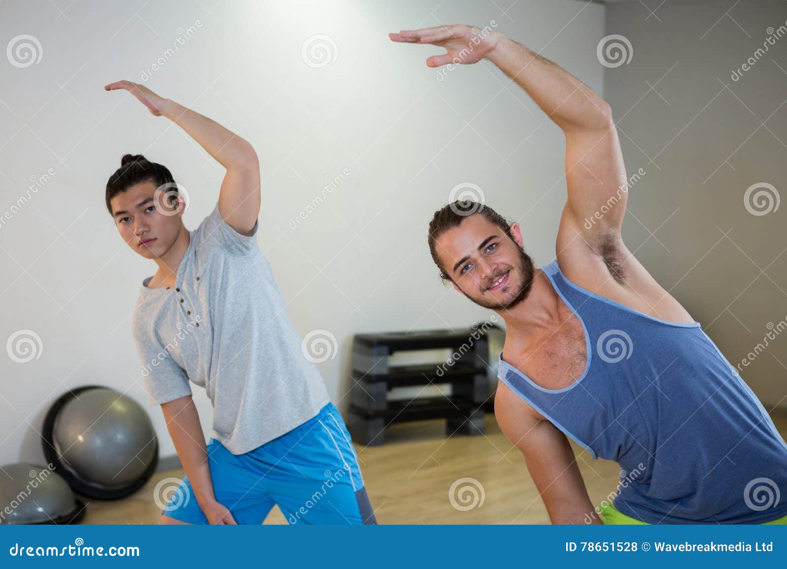 Smiling Two Men Doing Aerobic Exercise Stock Photo - Image of people ...