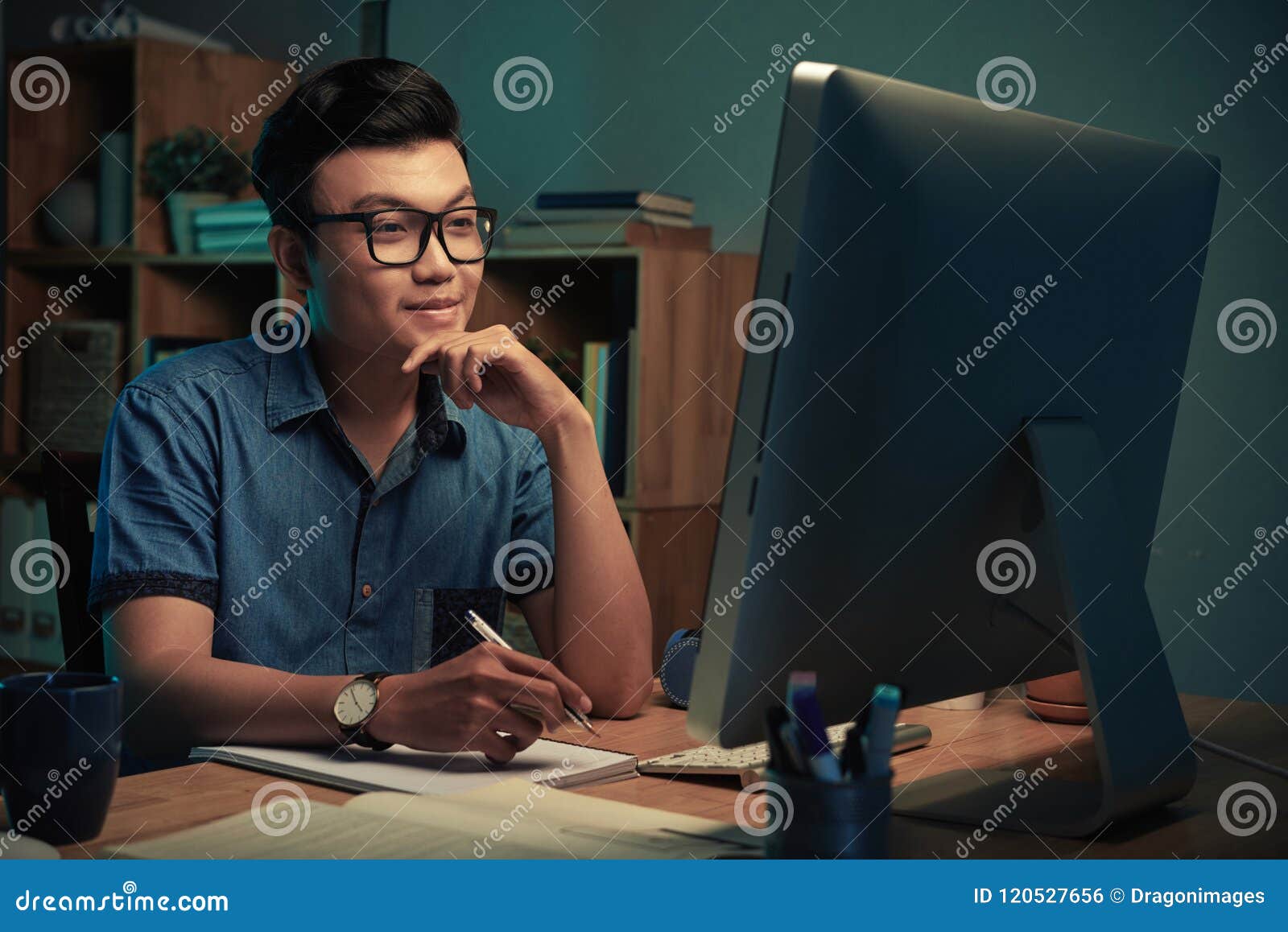 Man studying at home stock photo. Image of notepad, enjoying - 120527656