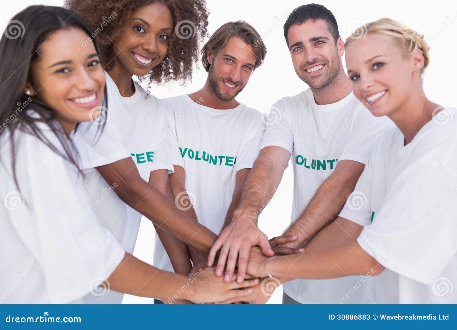 Smiling Volunteer Group Putting Hands Together Stock Image - Image of ...