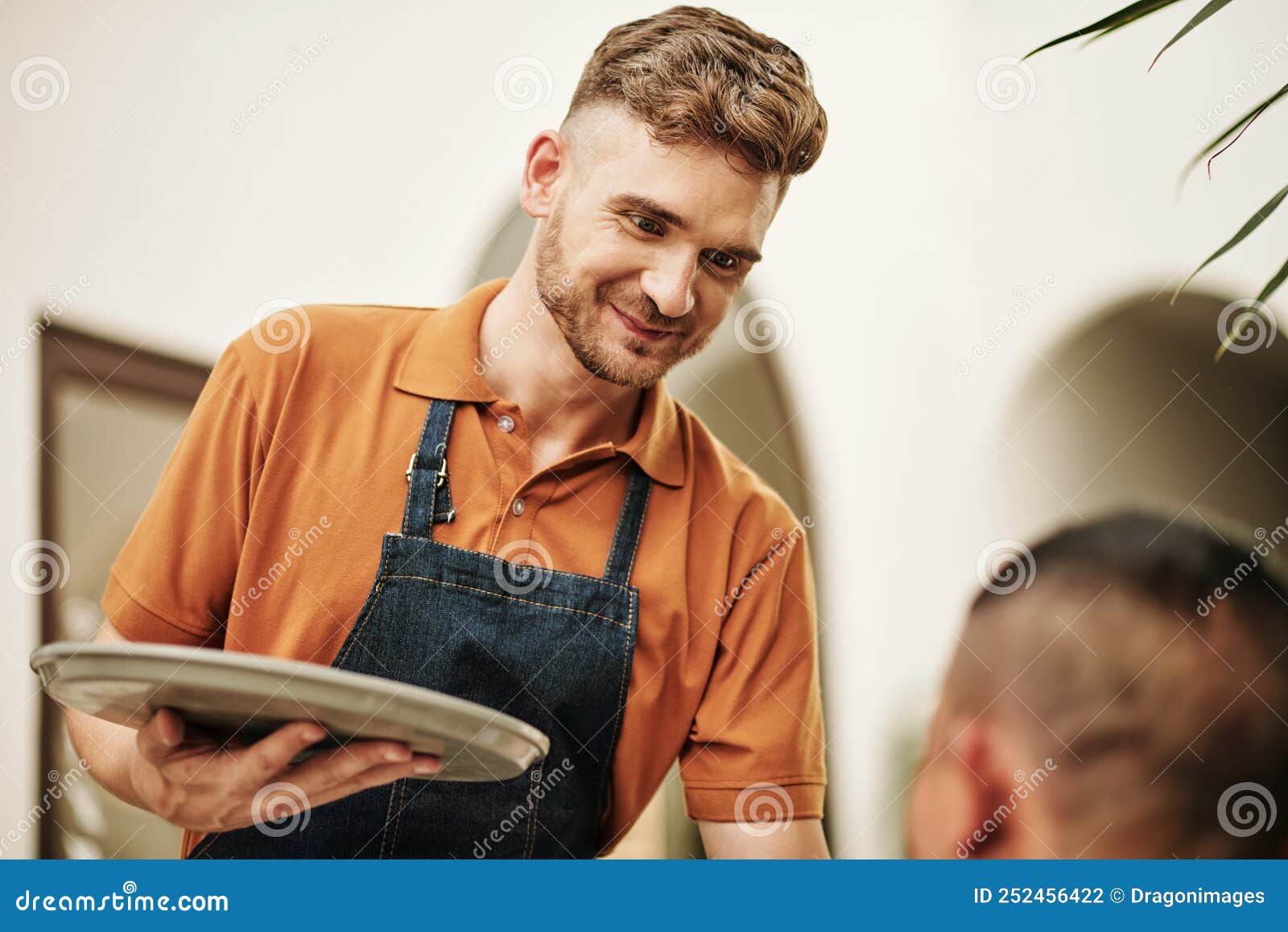 Waiter Talking to Customer stock photo. Image of owner - 252456422
