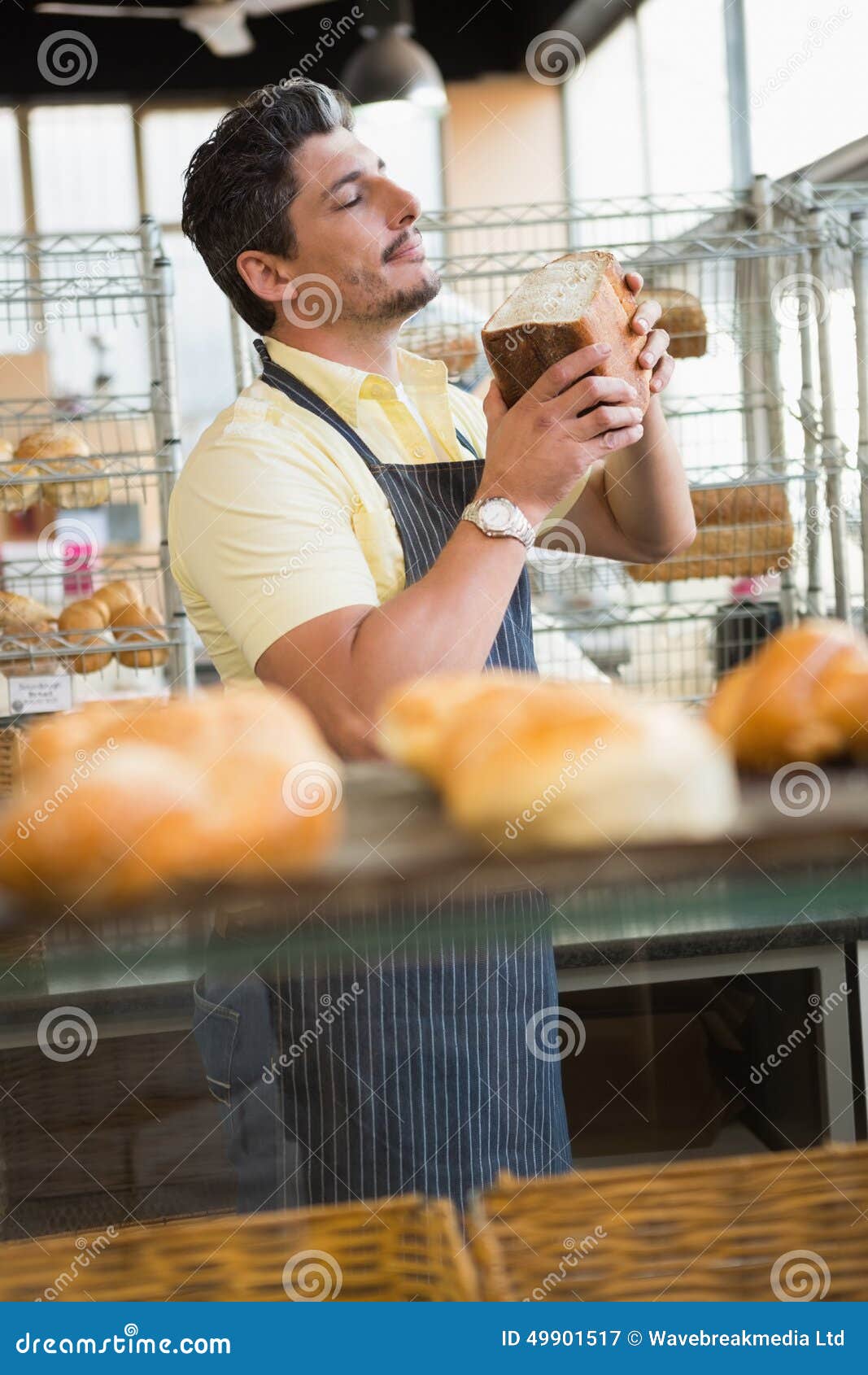 Smiling Waiter Smelling Bread Freshly Baked Stock Image - Image of ...