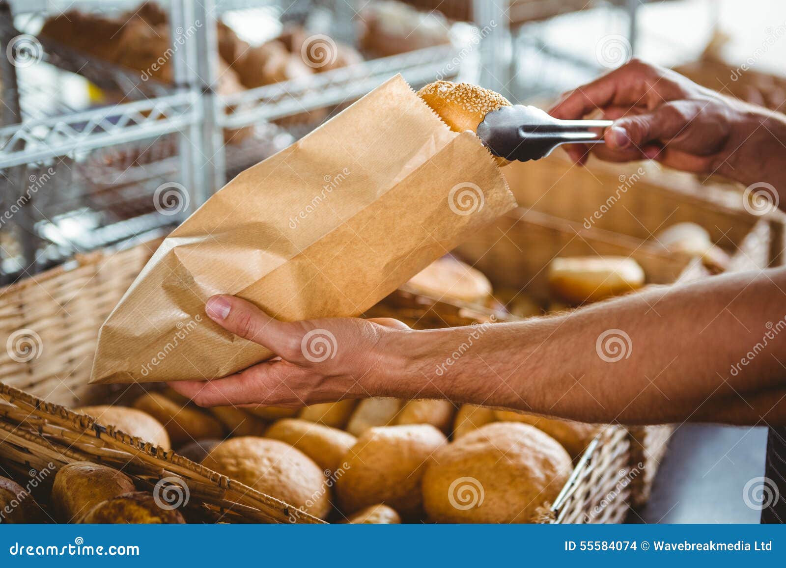 Smiling Waiter Taking Bread with Tongs Stock Photo - Image of caucasian ...