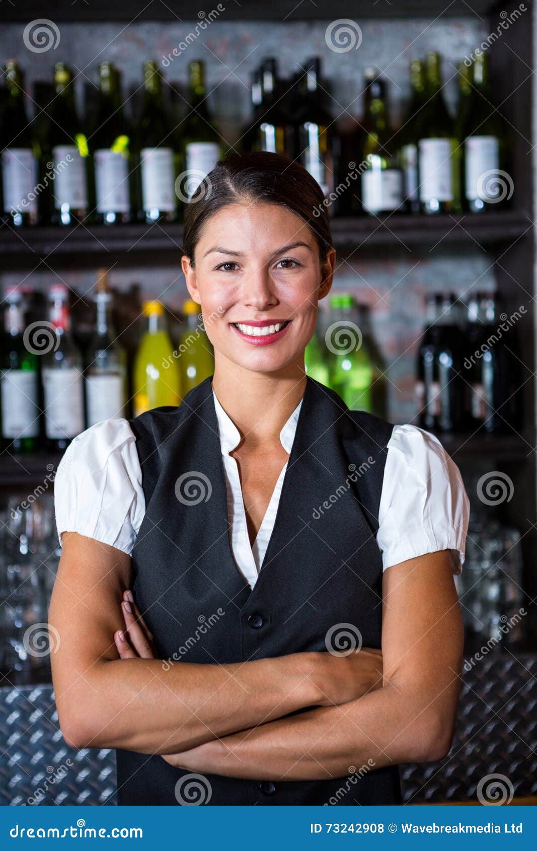 Smiling Waitress with Arms Crossed Stock Photo - Image of elegant ...