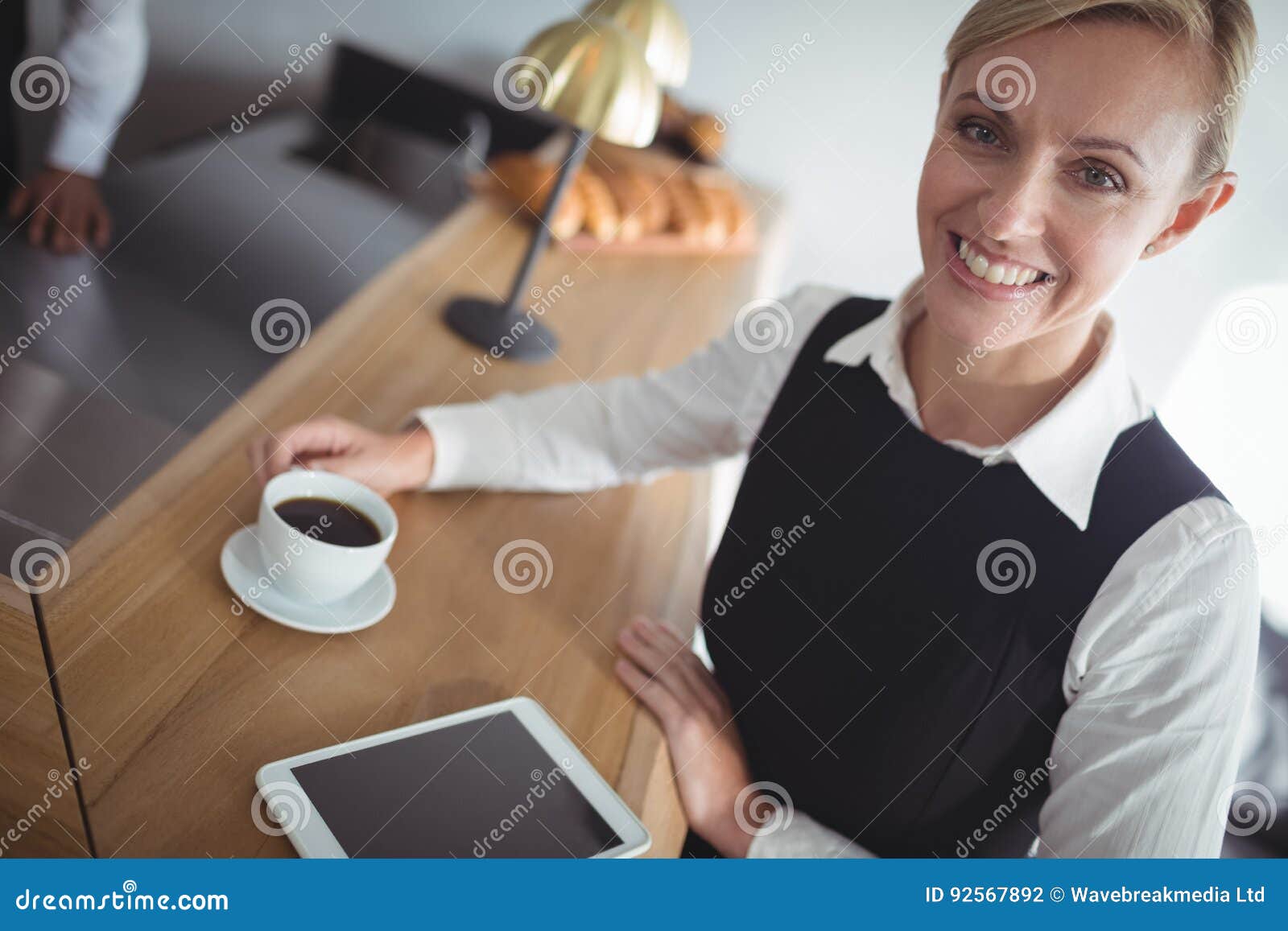 Smiling Waitress at Counter Stock Photo - Image of female, beverage ...