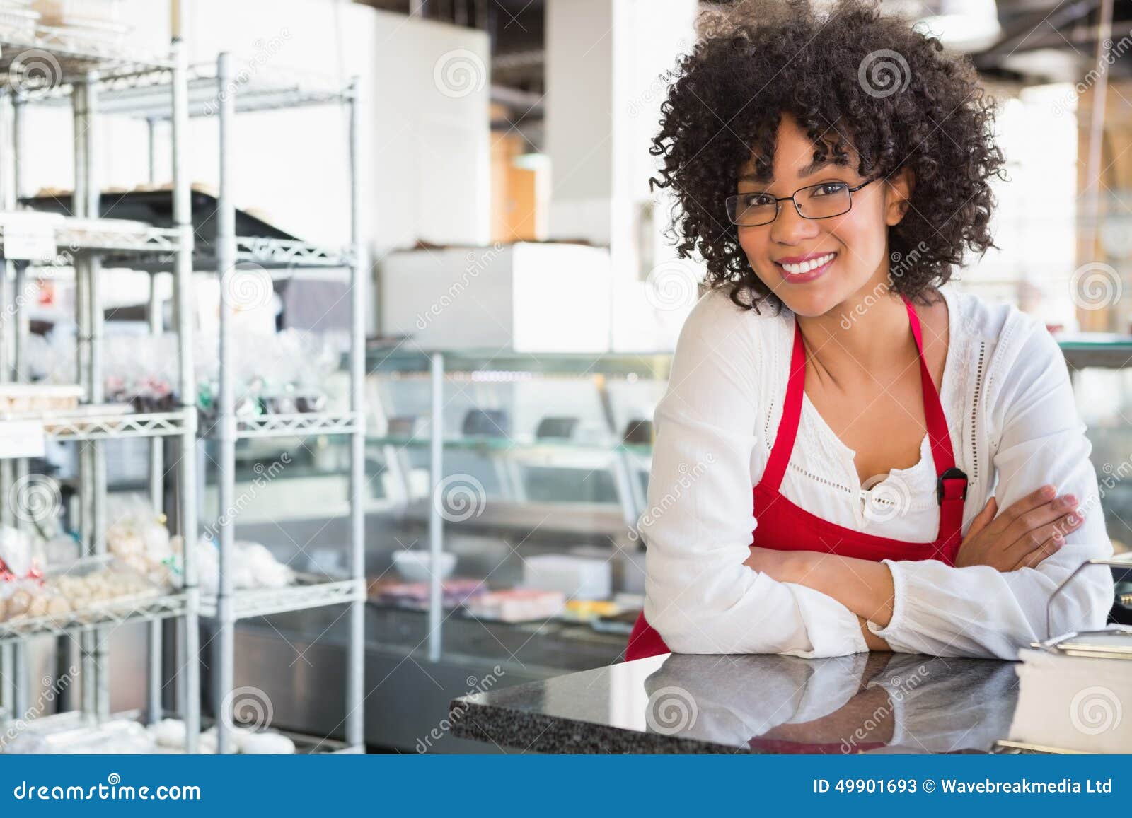 Smiling Waitress with Glasses Leaning on Counter Stock Image - Image of ...