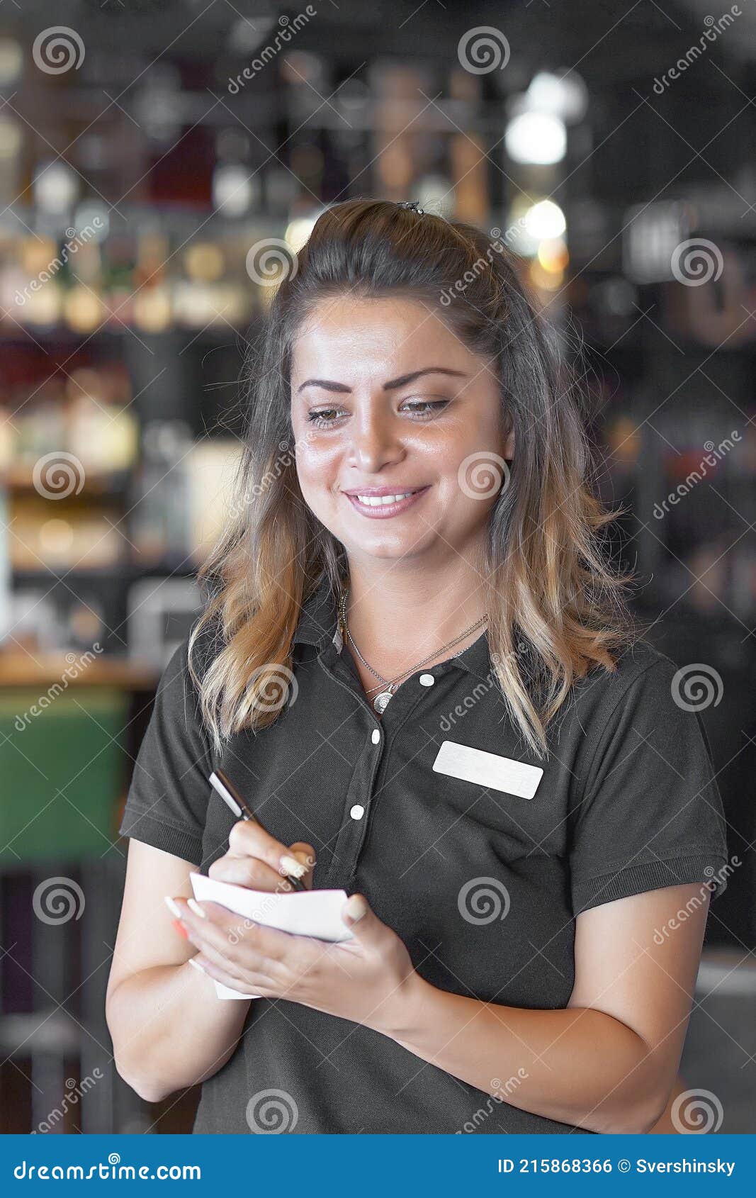 Smiling Waitress Taking an Order in a Restaurant Stock Photo - Image of ...