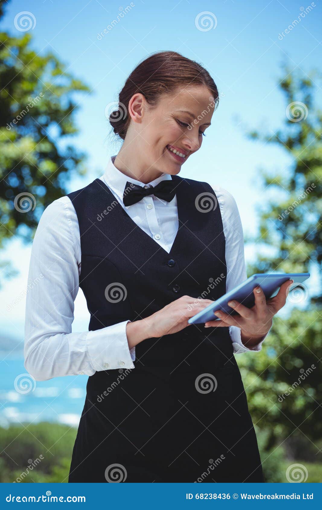 Smiling Waitress Taking an Order with a Tablet Stock Photo - Image of ...