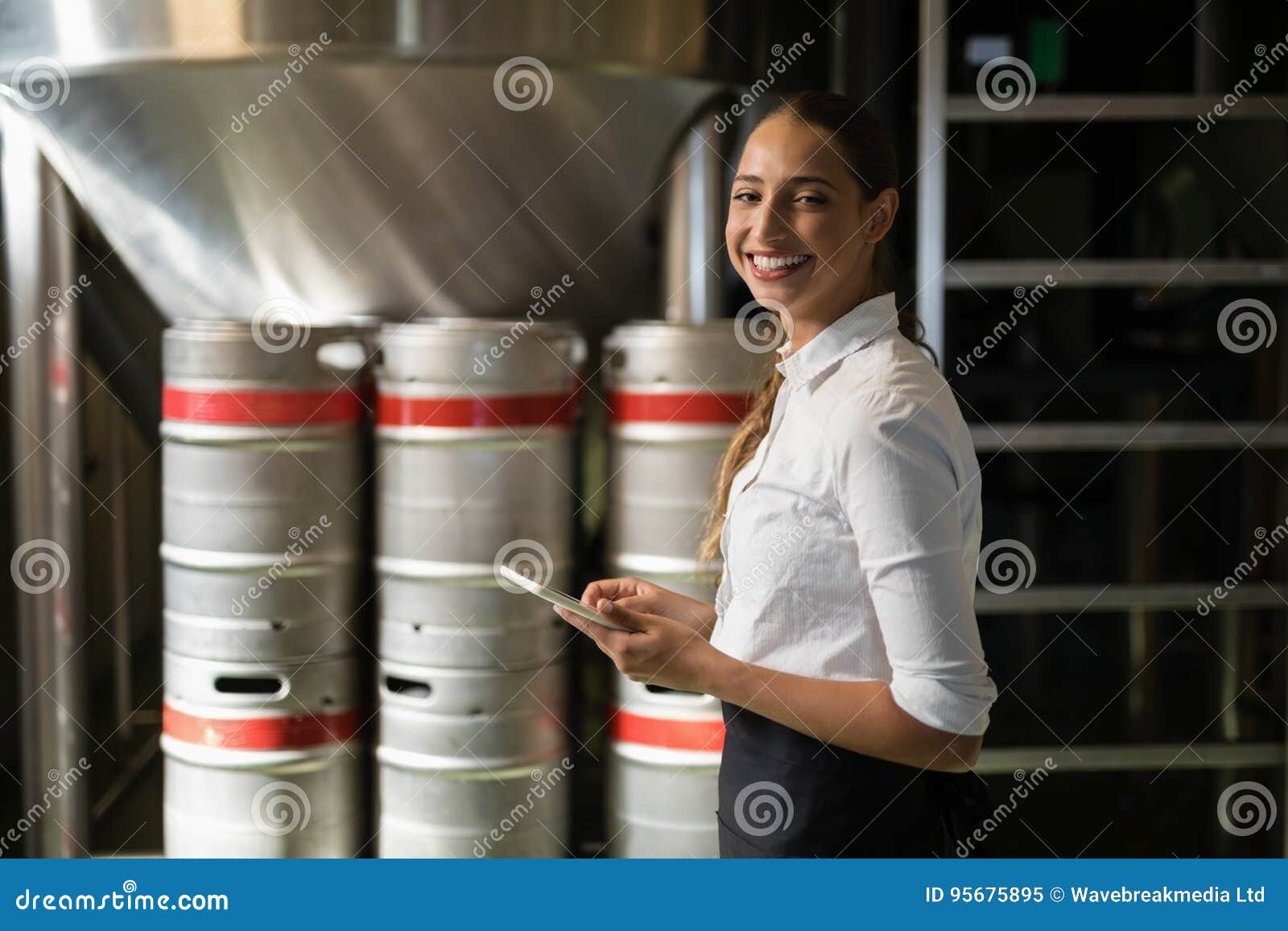 Smiling Waitress Using Digital Tablet in Bar Stock Image - Image of ...