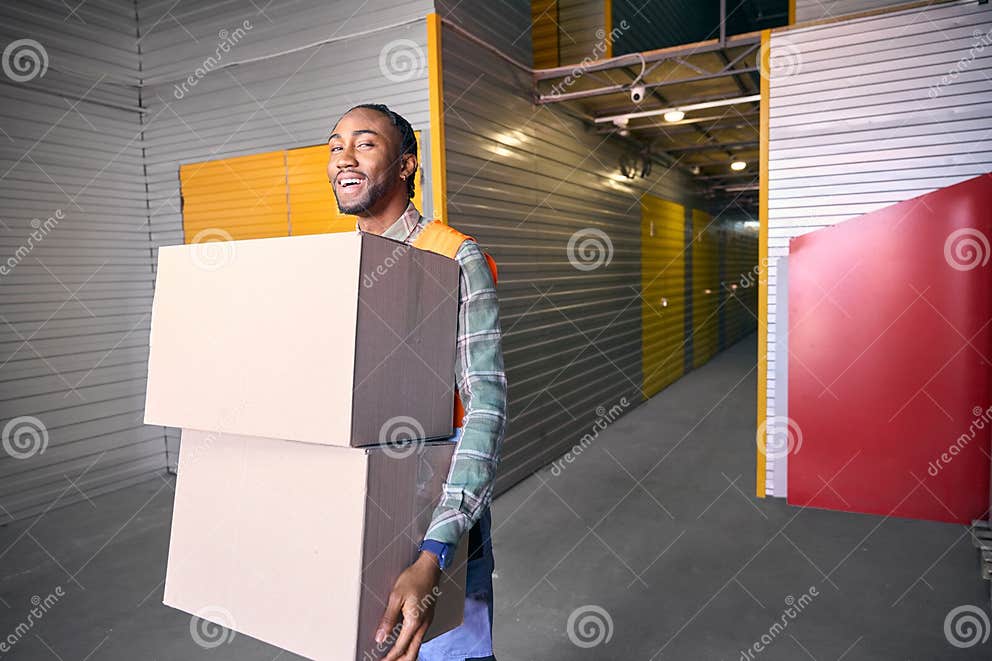 Smiling Warehouse Loader Posing for Camera at Work Stock Photo - Image ...