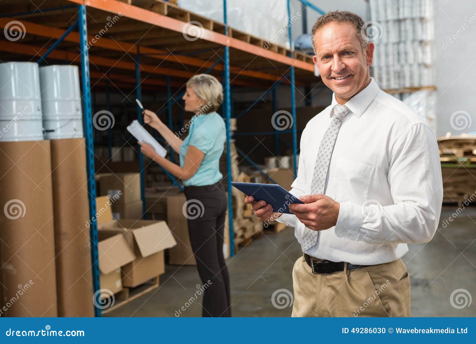 Smiling Warehouse Manager Using Tablet Pc Stock Photo - Image of making ...