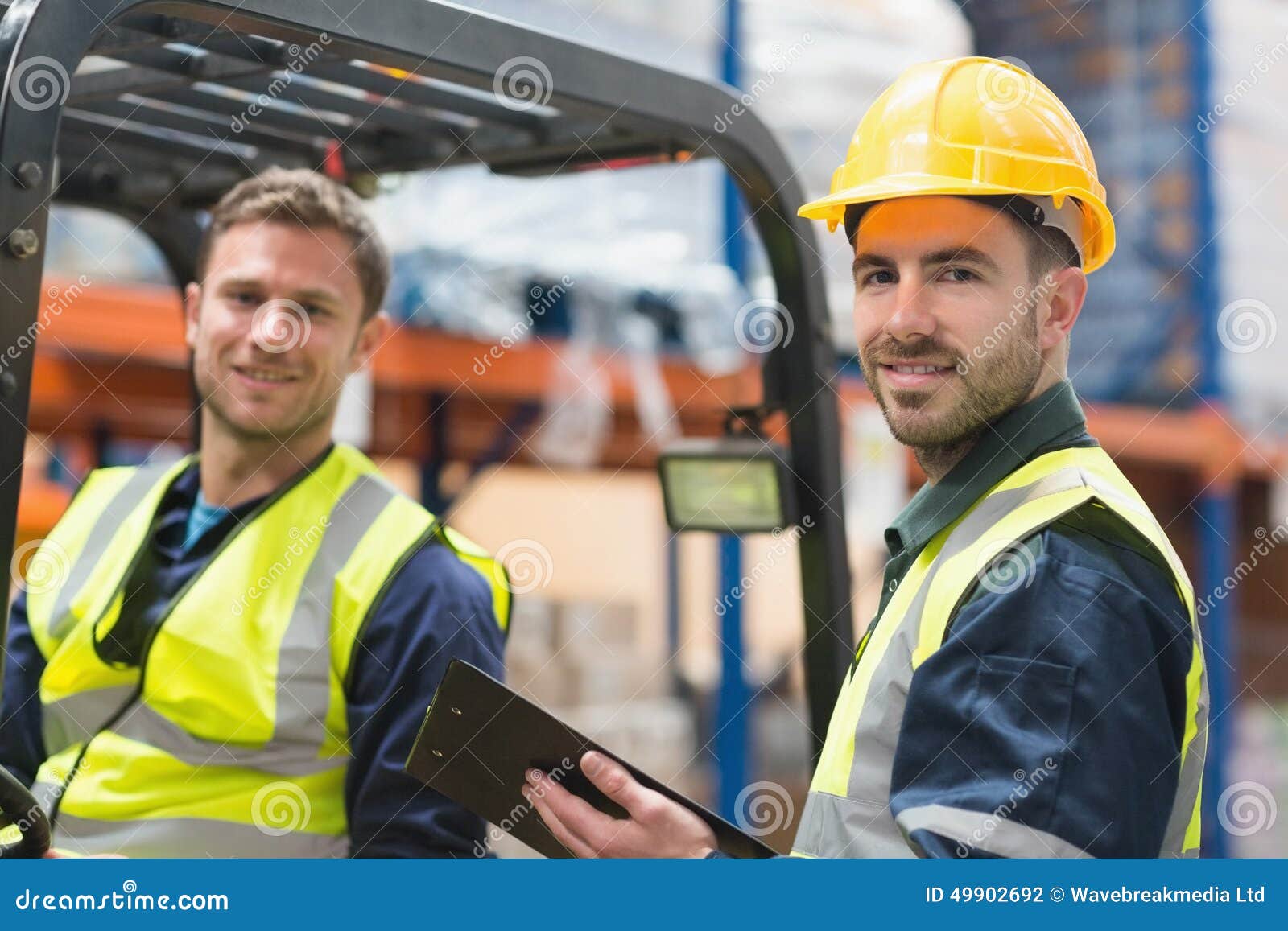 Smiling Warehouse Worker and Forklift Driver Stock Photo - Image of ...