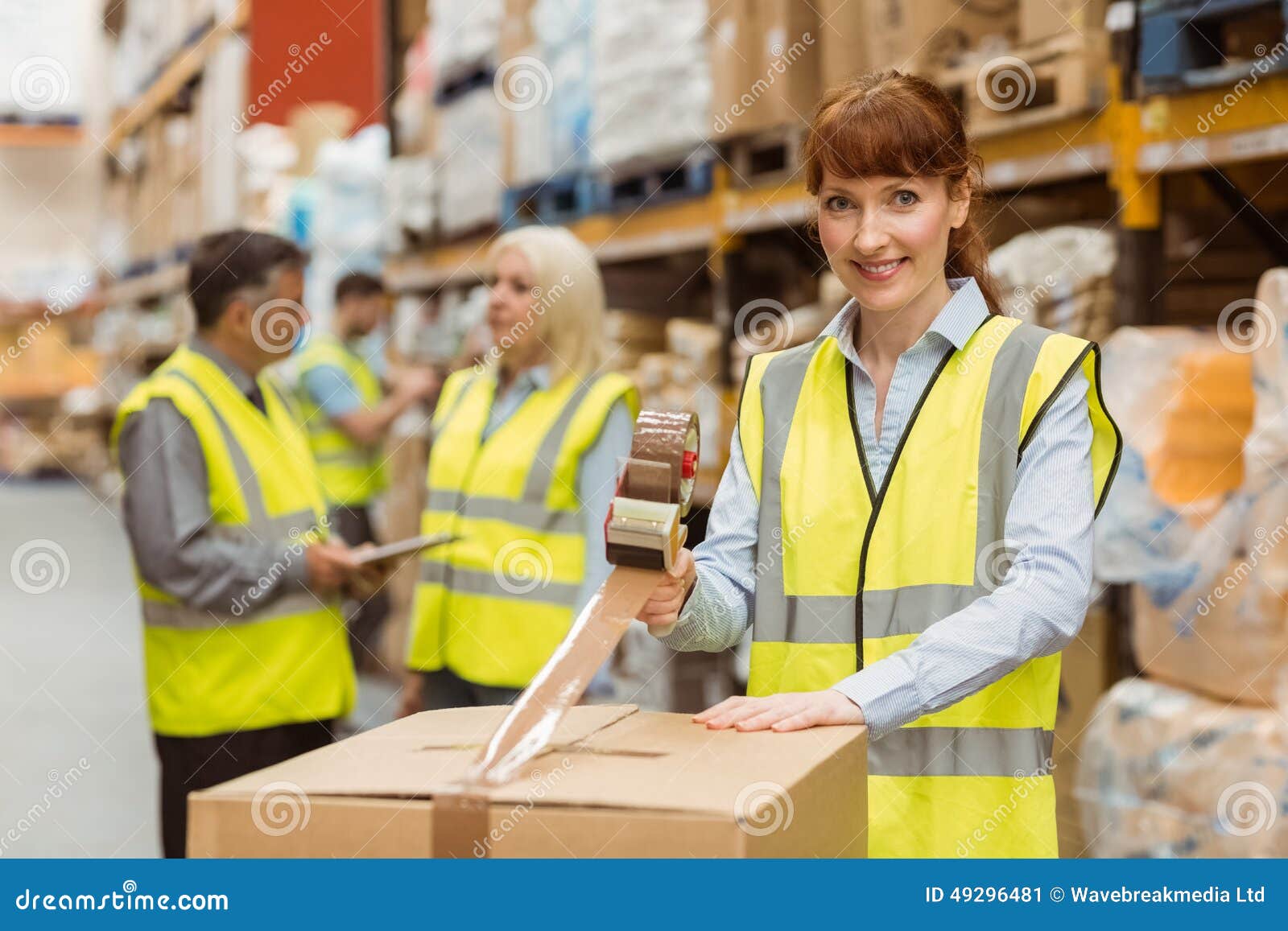 Smiling Warehouse Workers Preparing a Shipment Stock Image - Image of ...