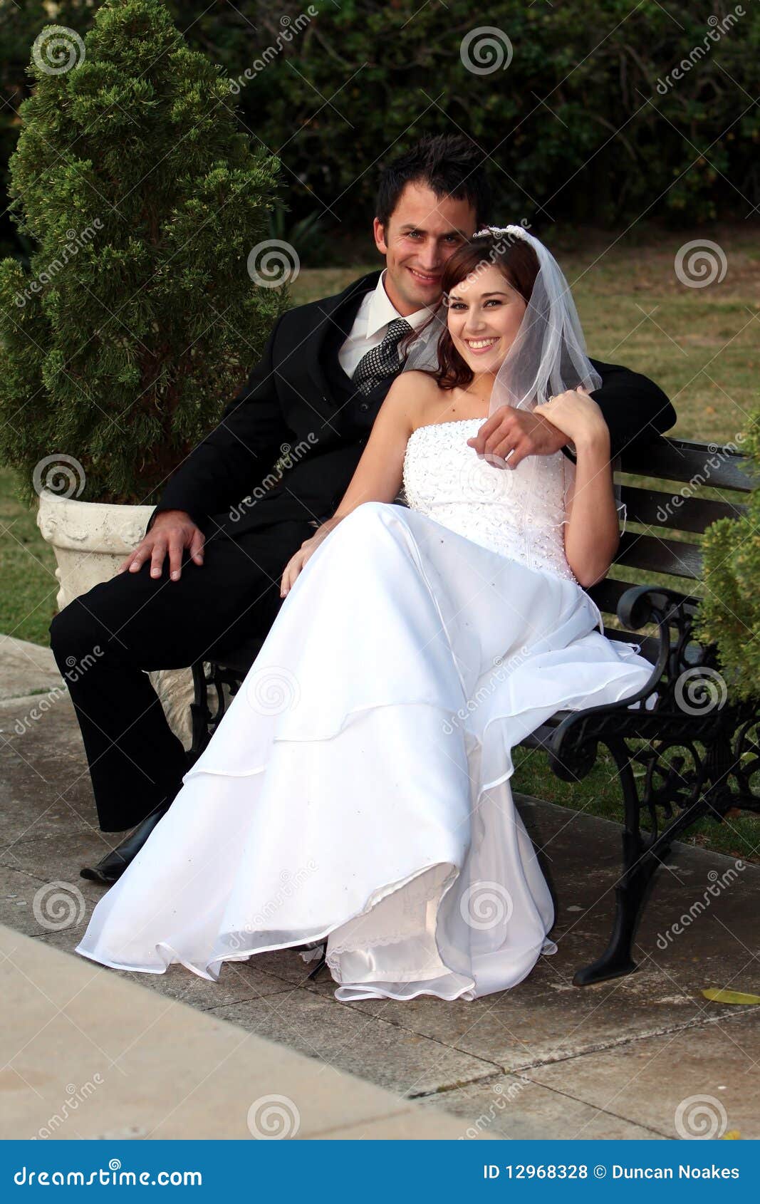 Smiling Wedding Couple stock photo. Image of celebration - 12968328
