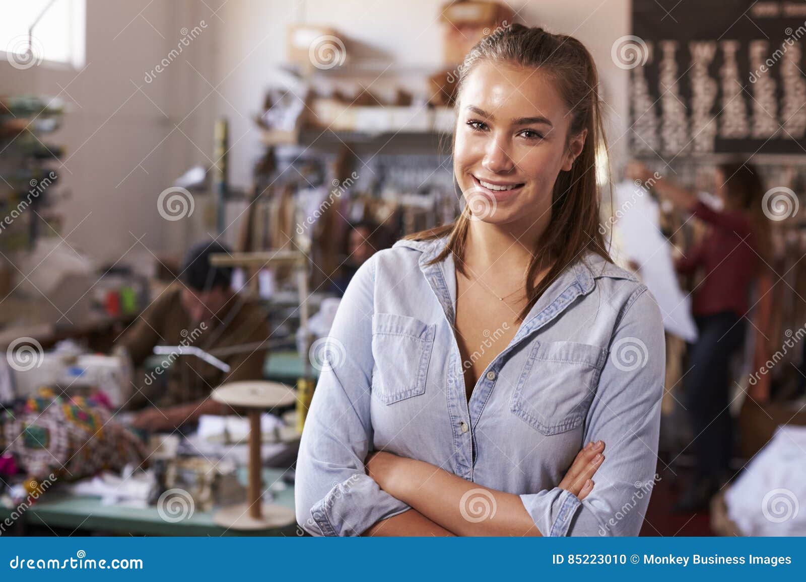 Smiling White Female Clothes Designer in Design Studio Stock Photo ...