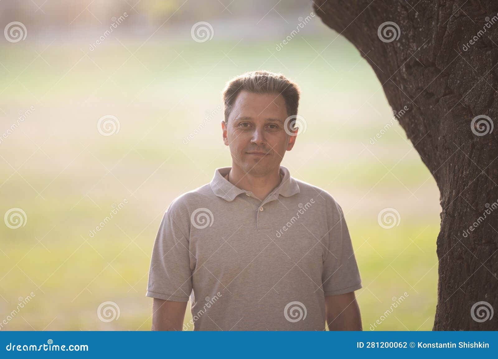 Smiling White Man Standing on Nature Stock Photo - Image of face ...