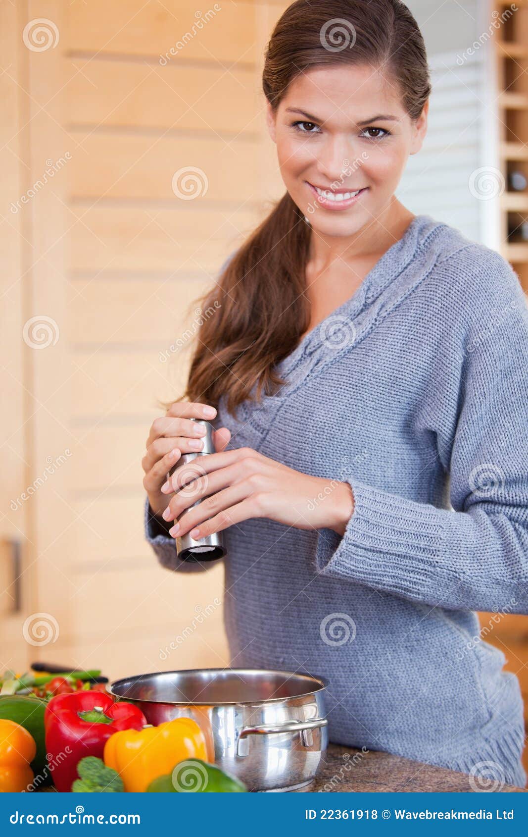 Smiling Woman Adding Spices To Her Stew Stock Photo - Image of house ...