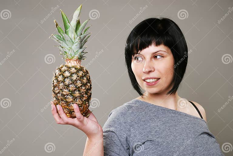 Smiling woman with ananas stock photo. Image of laughing - 24257496