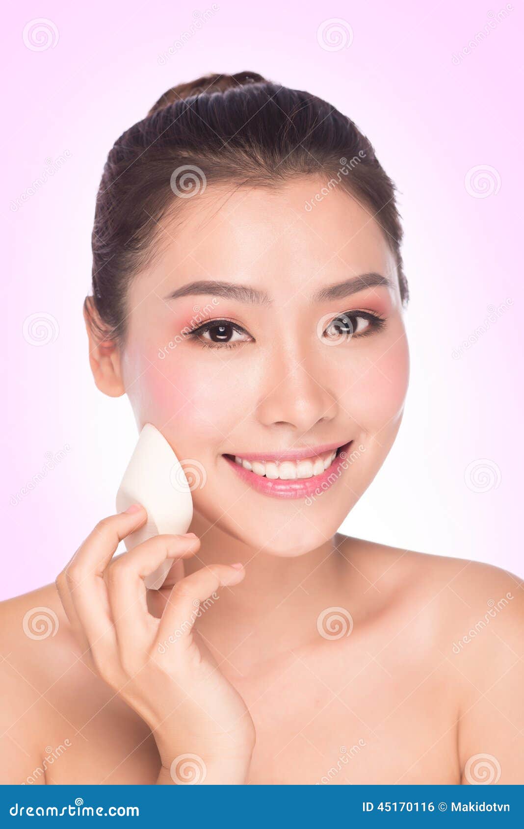 Smiling Woman Applying a Make-up Base Stock Photo - Image of health ...