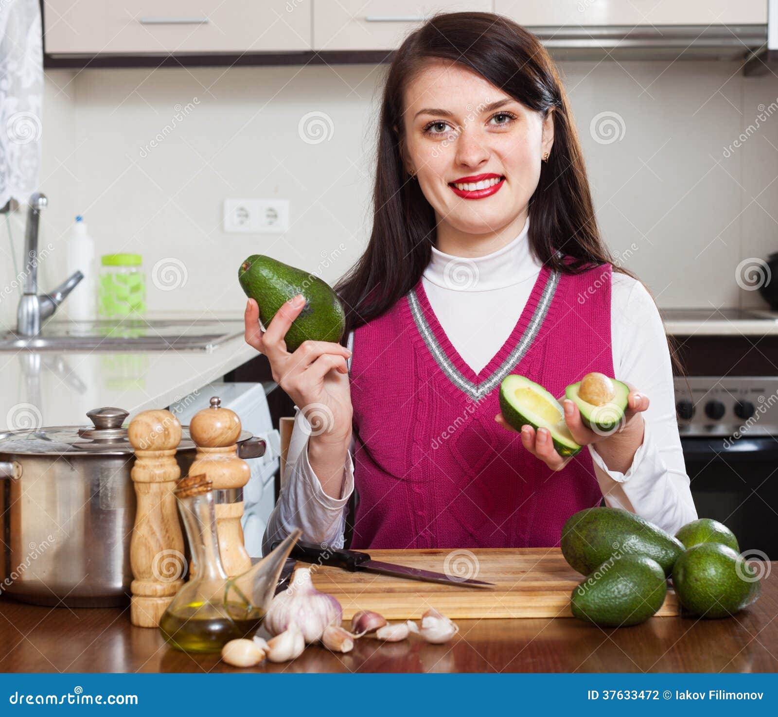 Smiling woman with avocado stock photo. Image of cuisine - 37633472