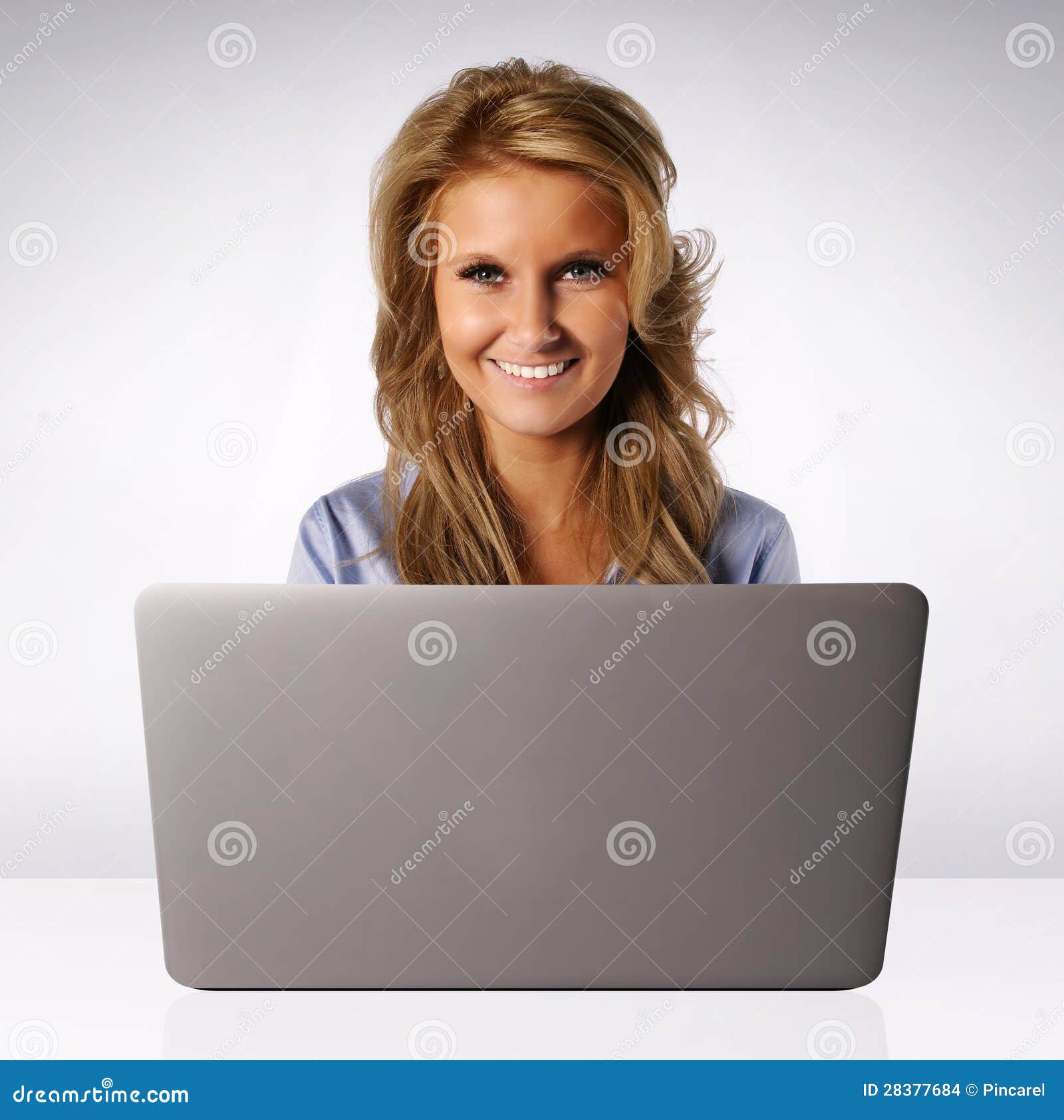 Smiling Woman Behind Laptop Computer Stock Photo - Image of isolated ...